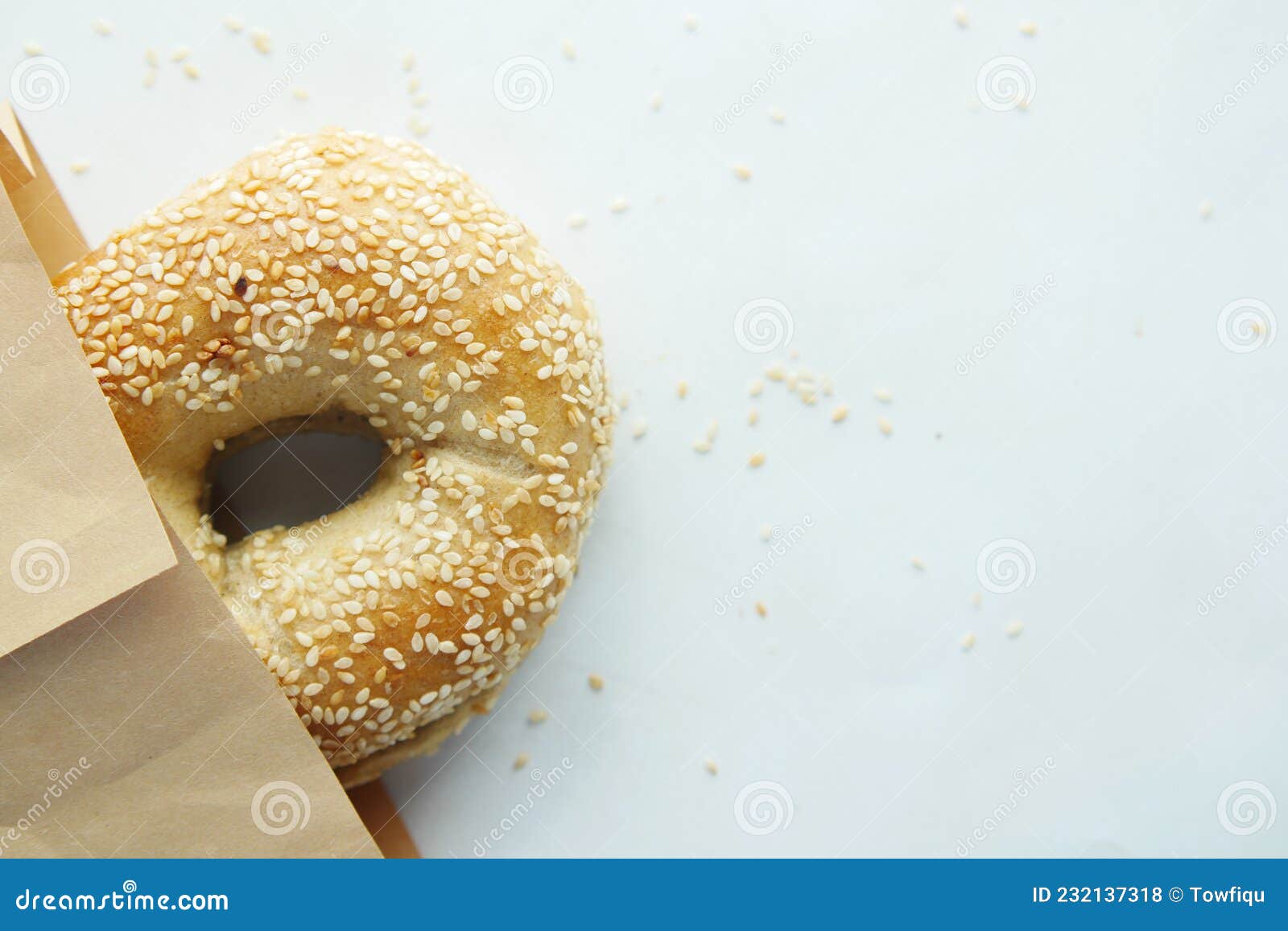 Bagel and Paper Packet on White Background Stock Photo - Image of ...