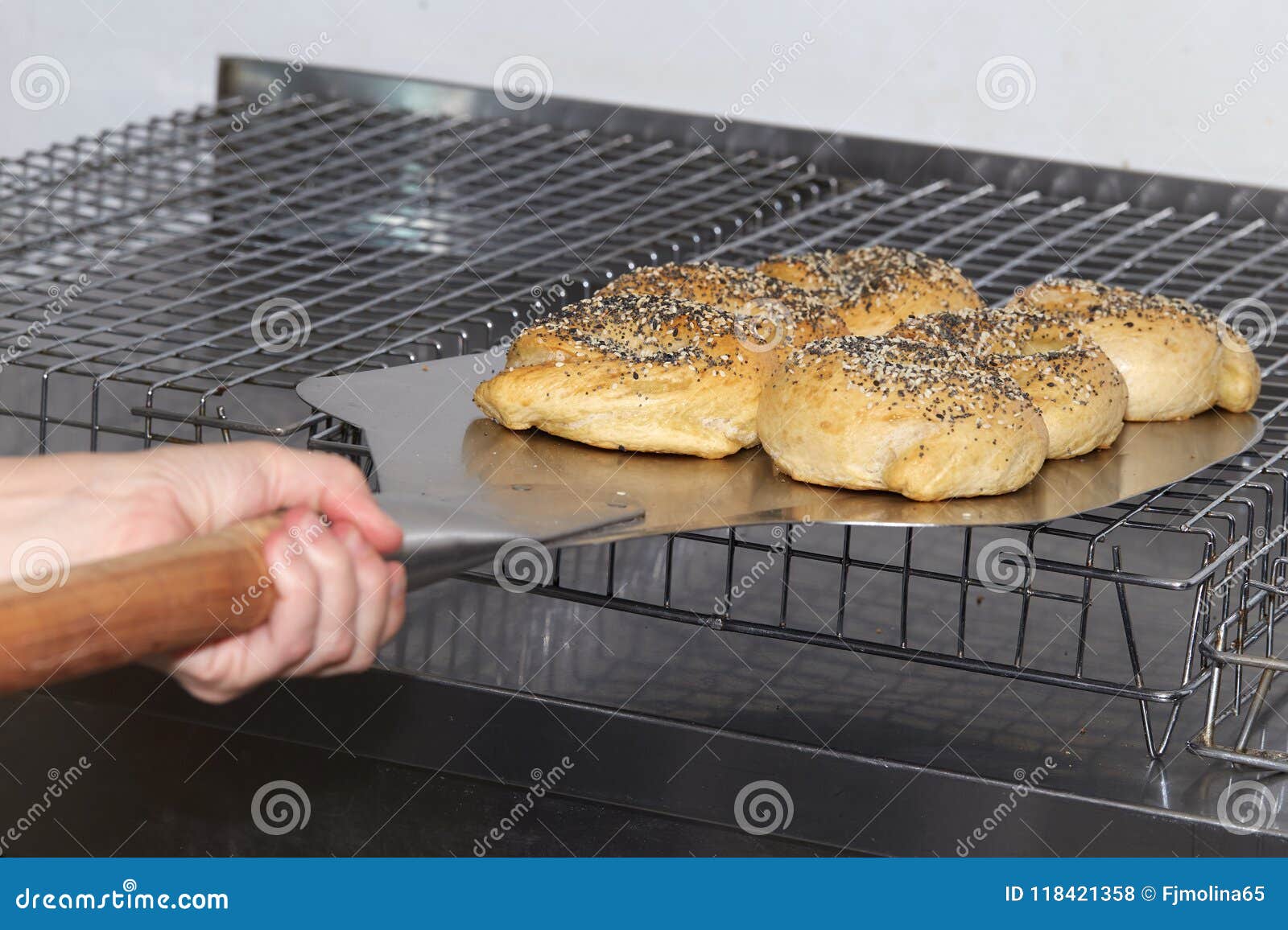 Baker making bagel stock photo. Image of industry, chef - 118421358