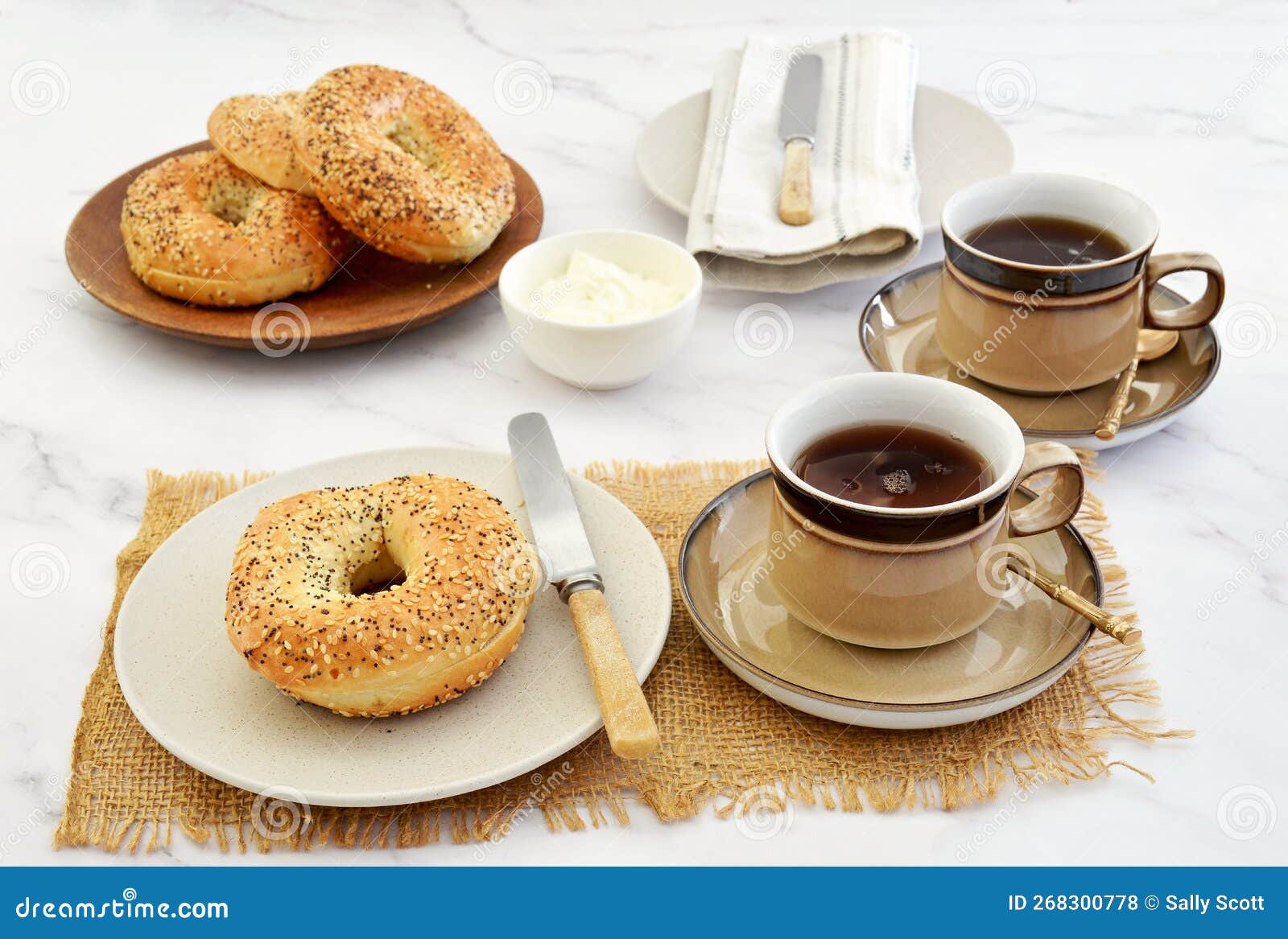 Bagels and Coffee Rustic Setting Stock Photo - Image of baked, saucers ...