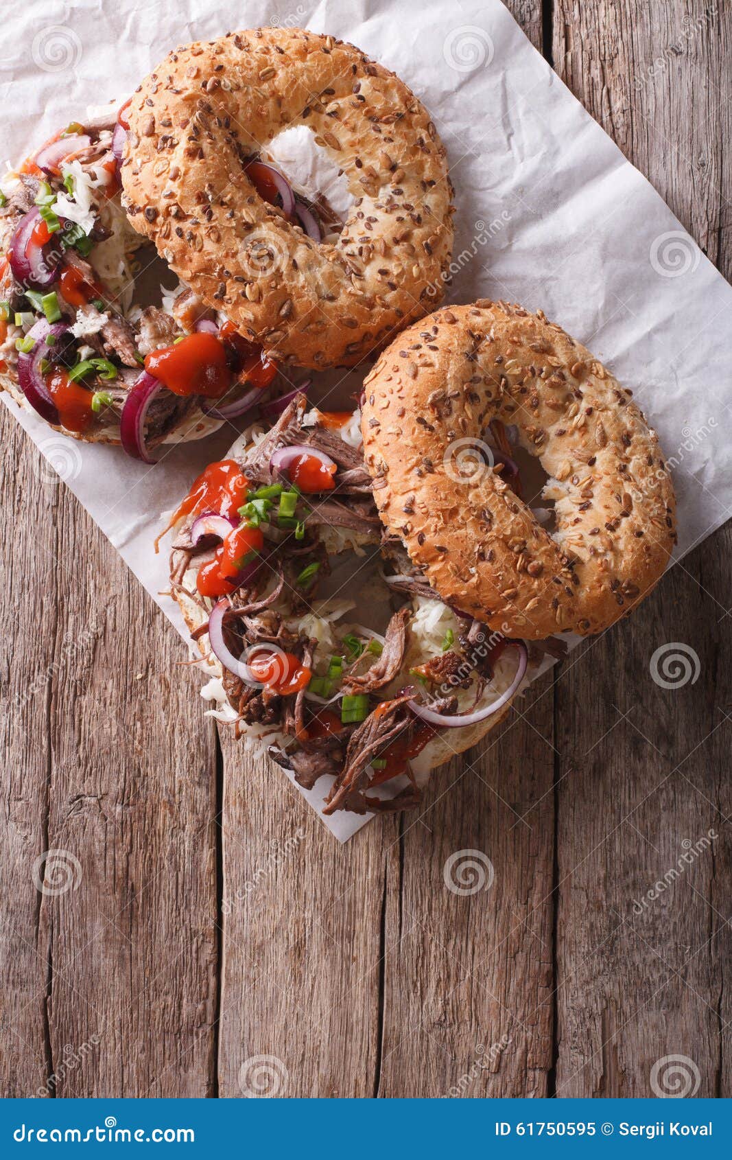 Bagels with Pulled Pork and Sauce on the Table. Vertical Top Vie Stock ...