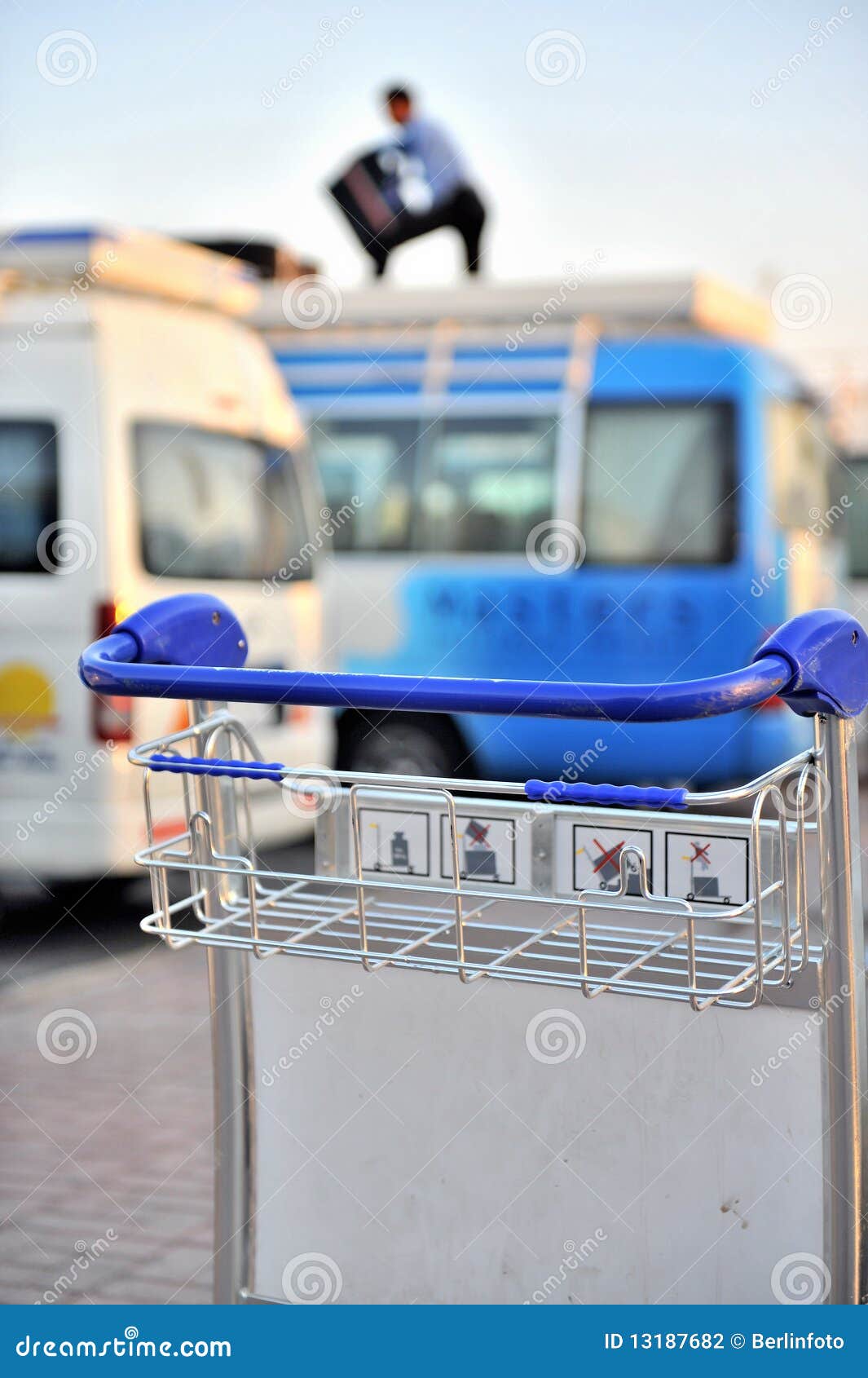 Baggage cart and buses stock photo. Image of loading - 13187682
