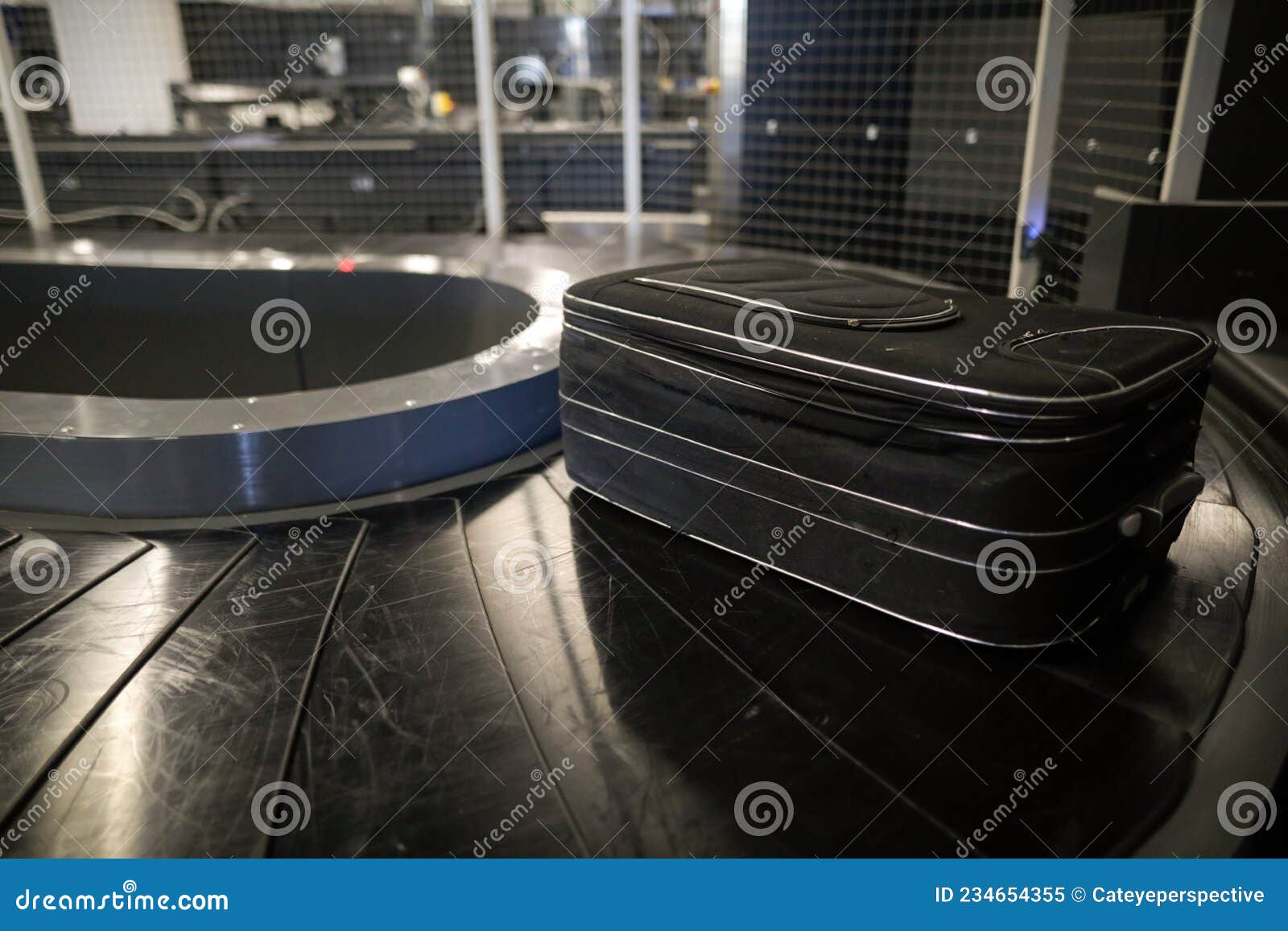 Baggage on a Conveyor Belt Inside a Luggage Sorting System at an ...