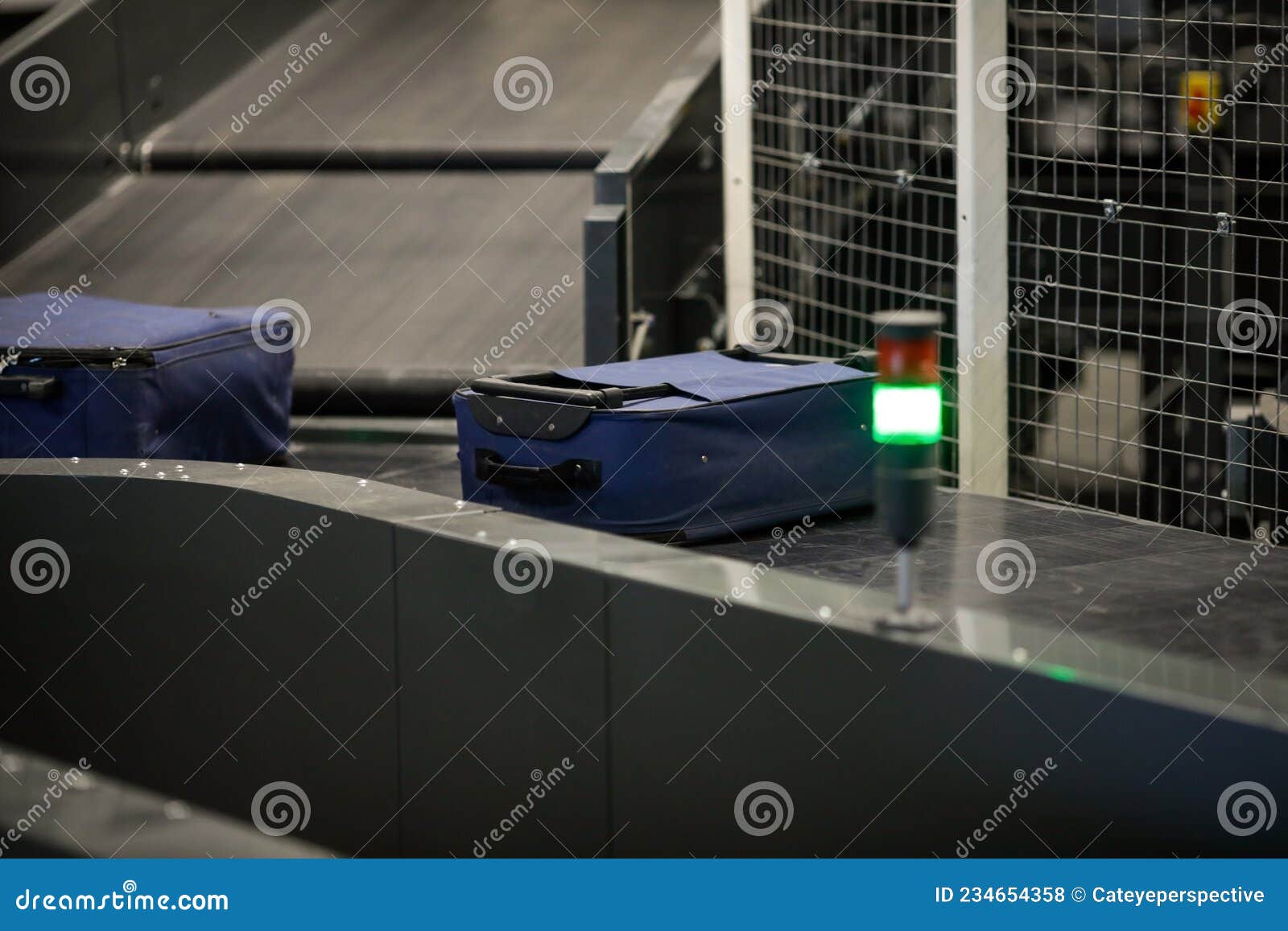 Baggage on a Conveyor Belt Inside a Luggage Sorting System at an ...