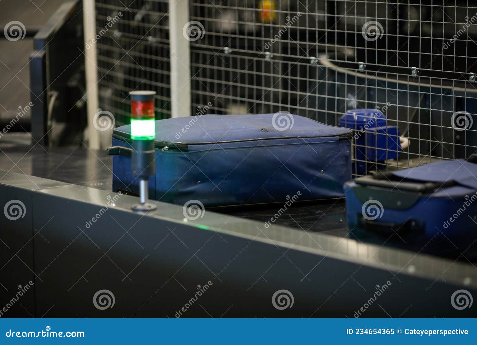 Baggage on a Conveyor Belt Inside a Luggage Sorting System at an ...