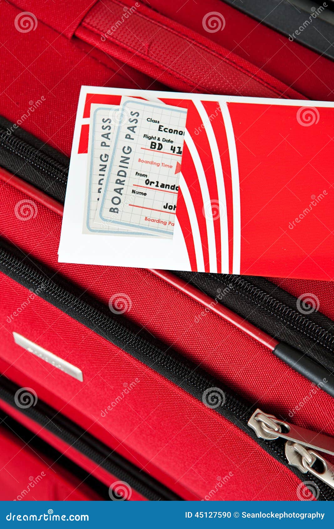 Baggage: Red Suitcase with Airline Ticket on Top Stock Photo - Image of ...