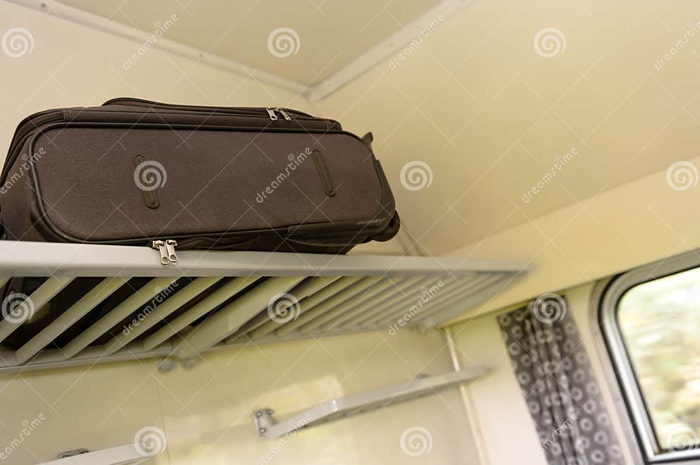 Baggage Sitting on Train Rack in Compartment Stock Image - Image of ...