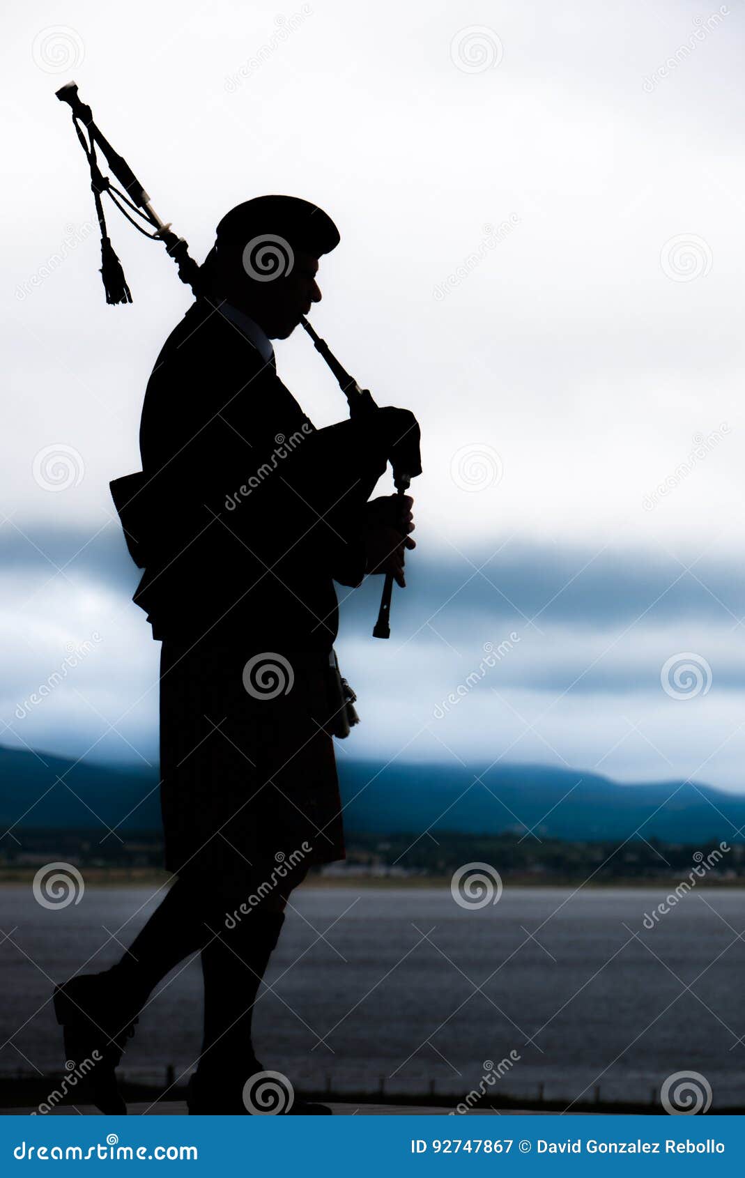 Bagpiper playing music editorial photography. Image of contrast - 92747867
