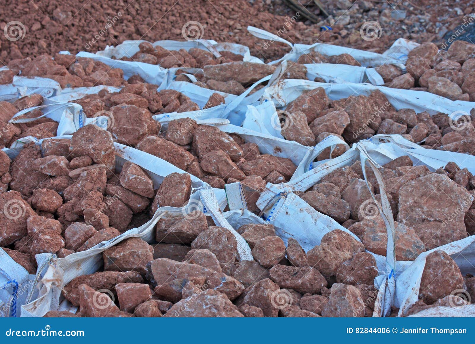 Bags of rocks stock photo. Image of concrete, building - 82844006