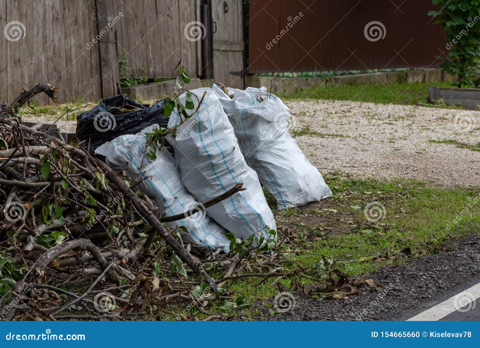 Bags of Rubbish on the Side of a Country Road Stock Photo - Image of ...