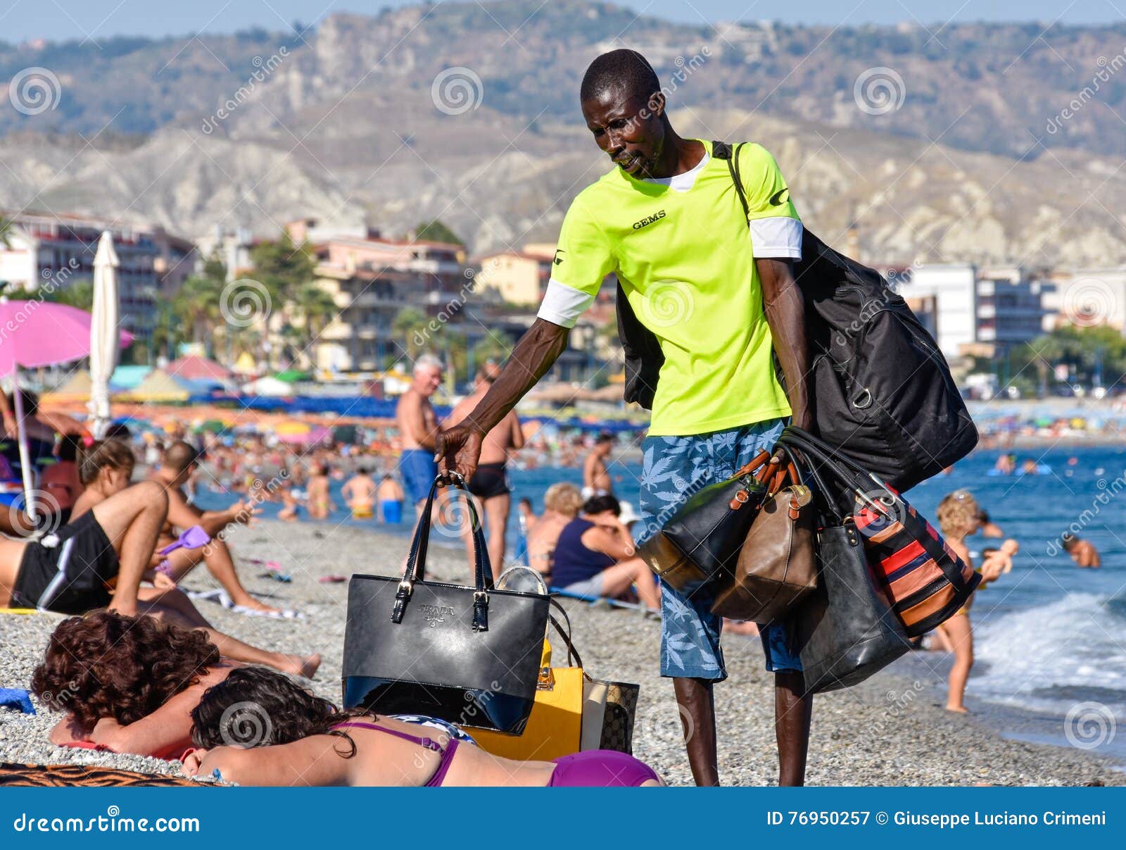 Bags Salesman on the Beach. Editorial Photography - Image of black ...