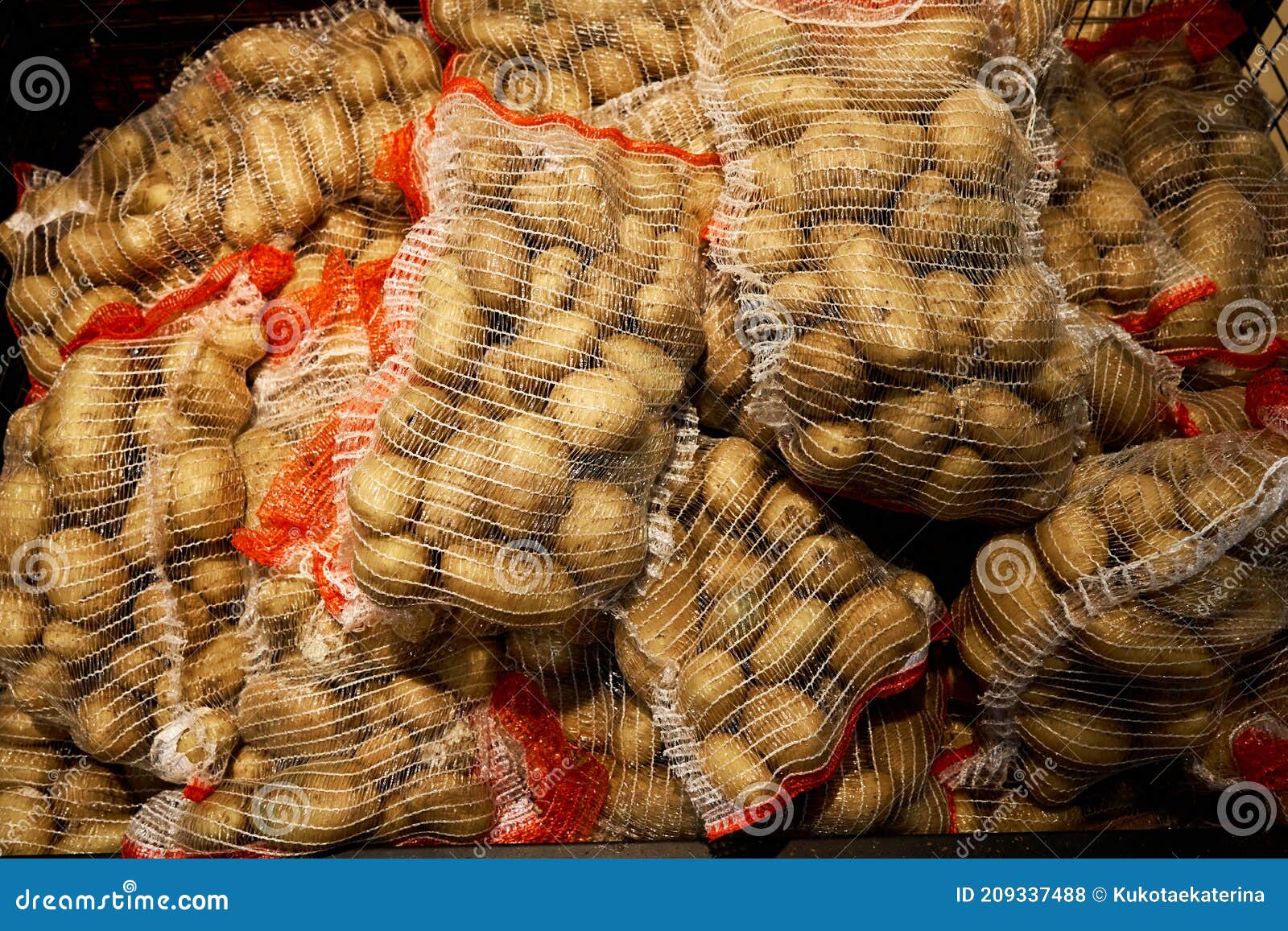 Bags of Washed Potatoes at the Grocery Store Stock Photo - Image of ...