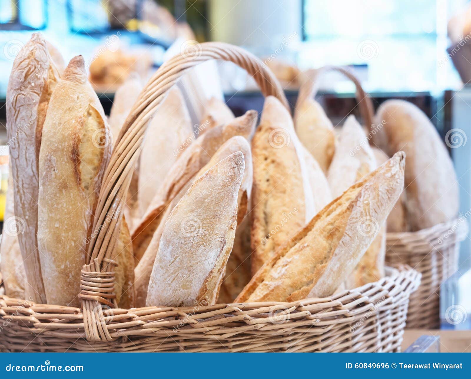 Baguette in Basket Display in Bakery Shop Stock Photo - Image of ...