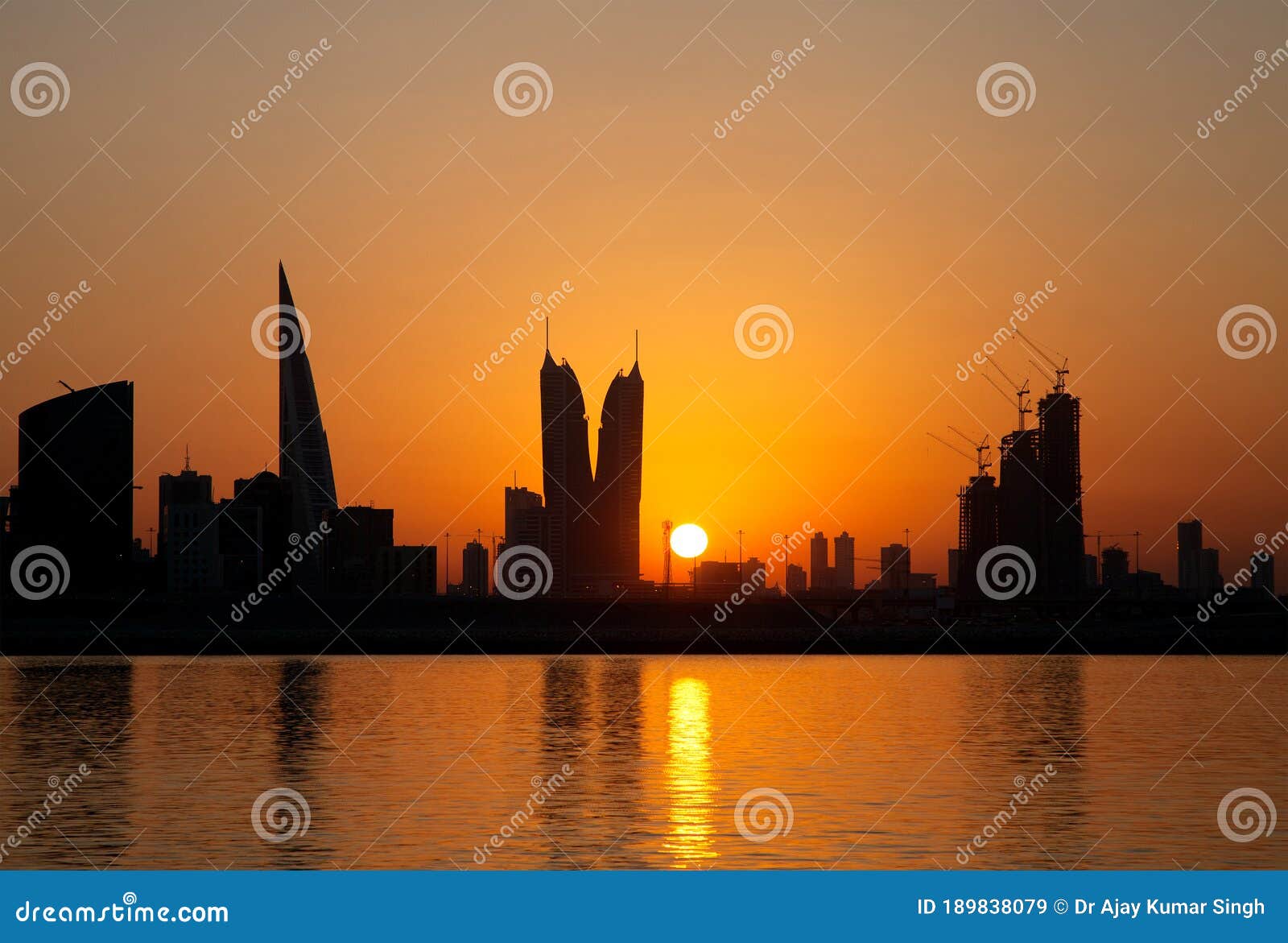 Bahrain skyline at sunset stock image. Image of light - 189838079