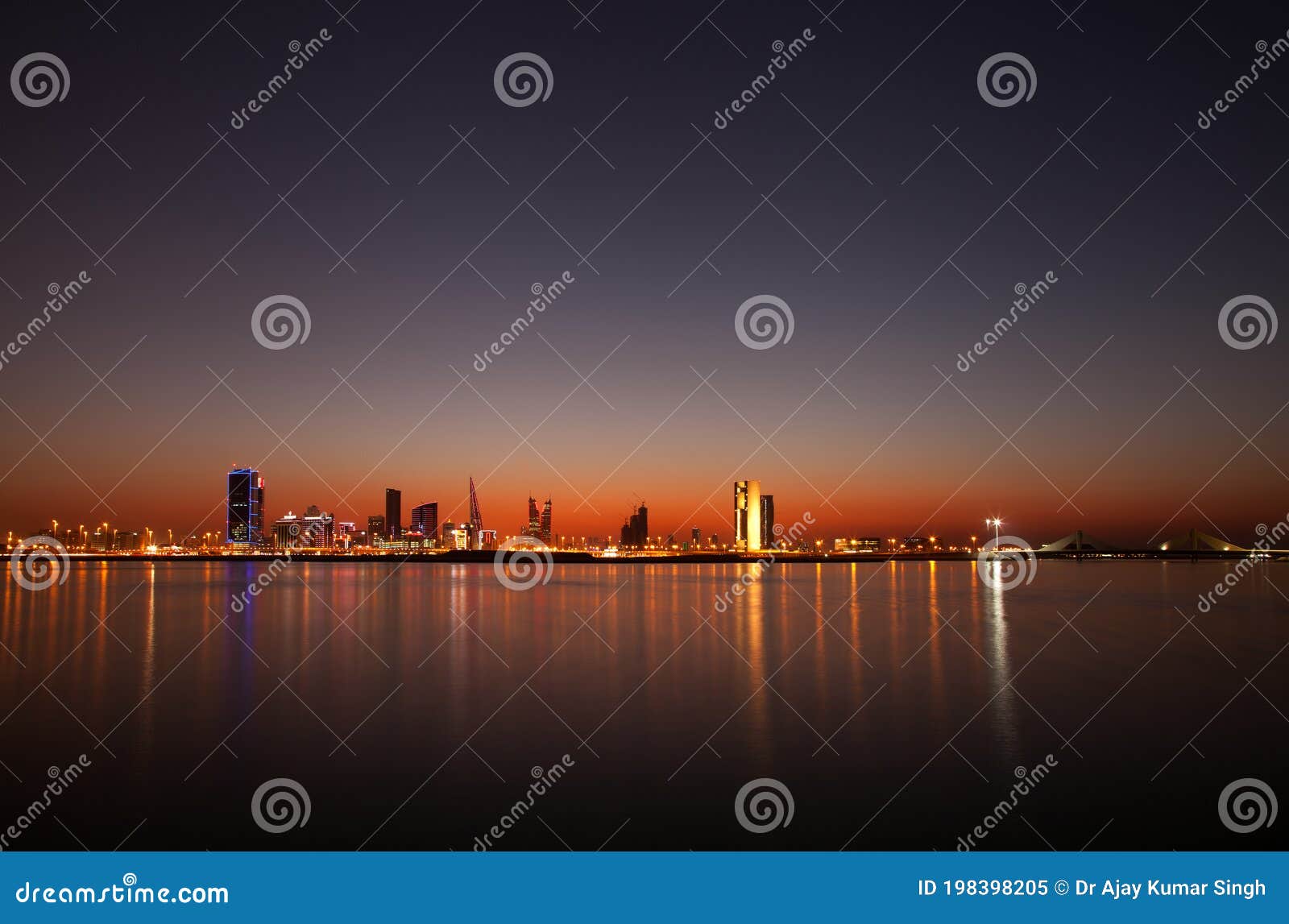 Bahrain skyline at sunset stock image. Image of orange - 198398205