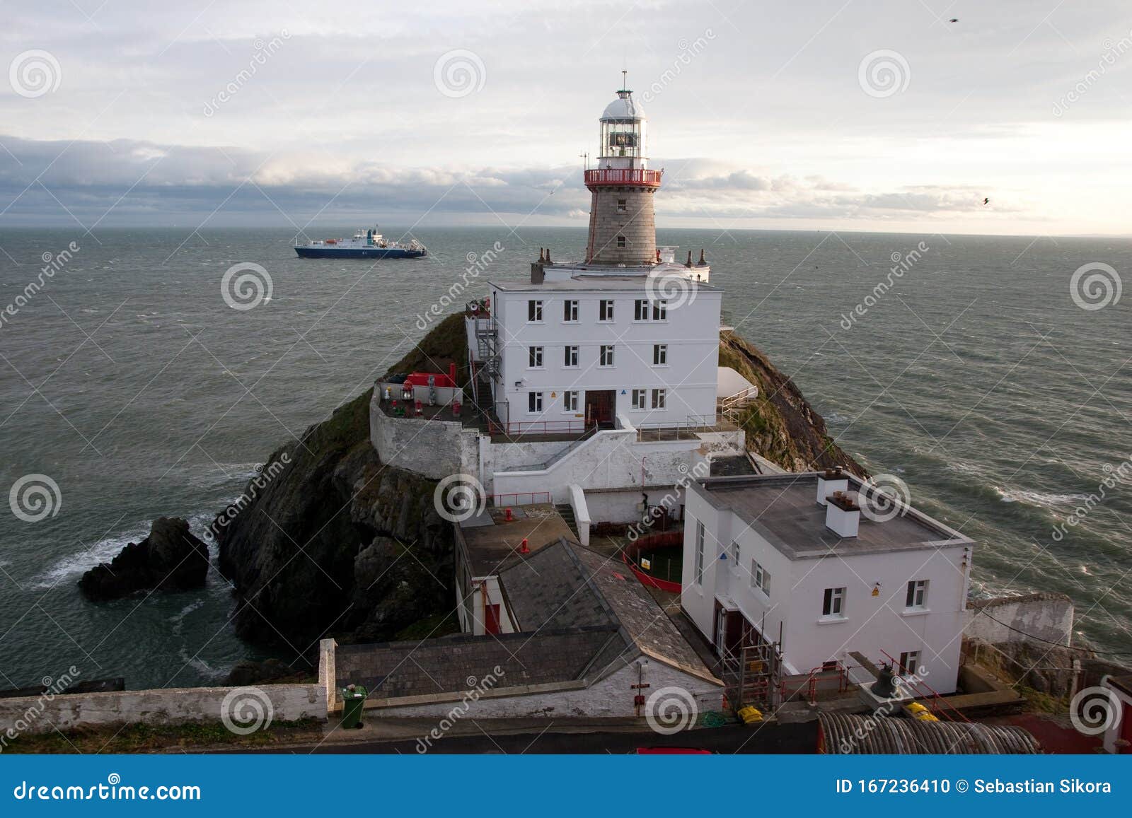 The Baily Lighthouse, Howth. Co Stock Photo - Image of sunset, seascape ...