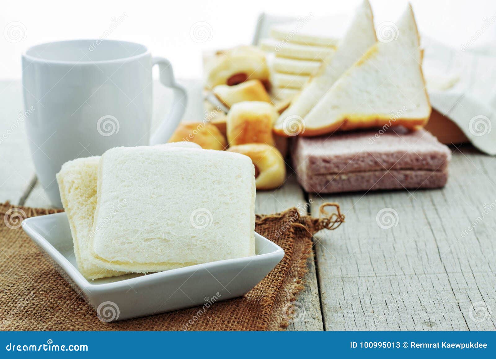 Bread and coffee on table. stock image. Image of cereal - 100995013
