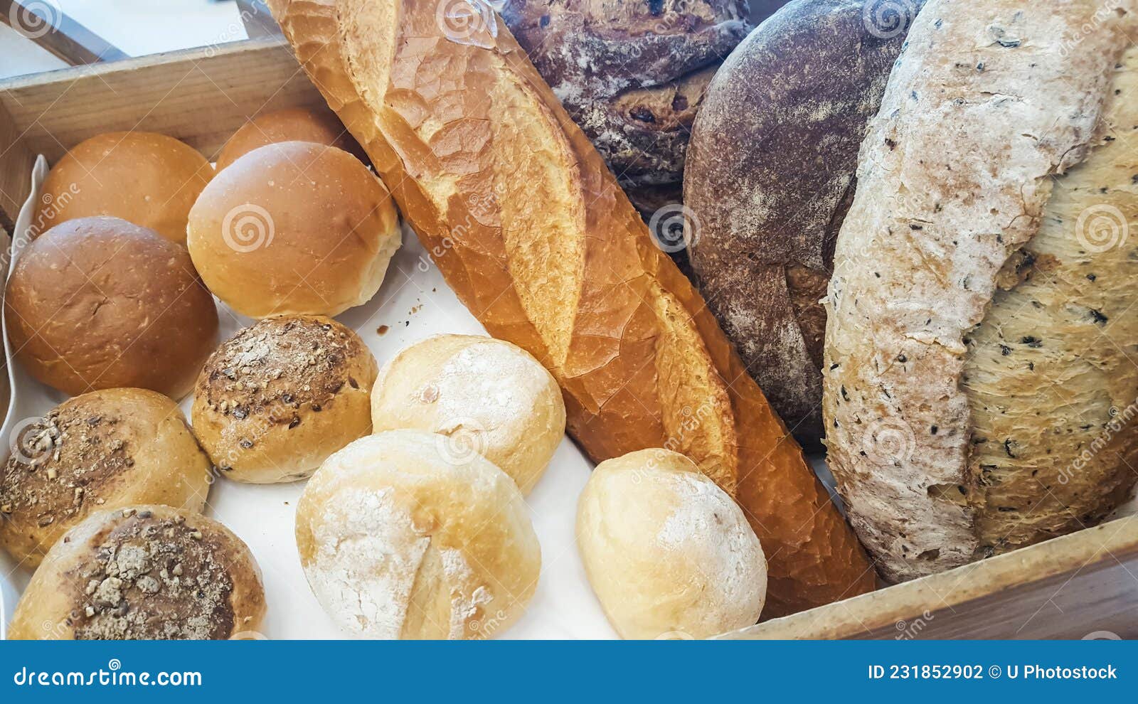 Baked bread in tray stock photo. Image of cereal, food - 231852902