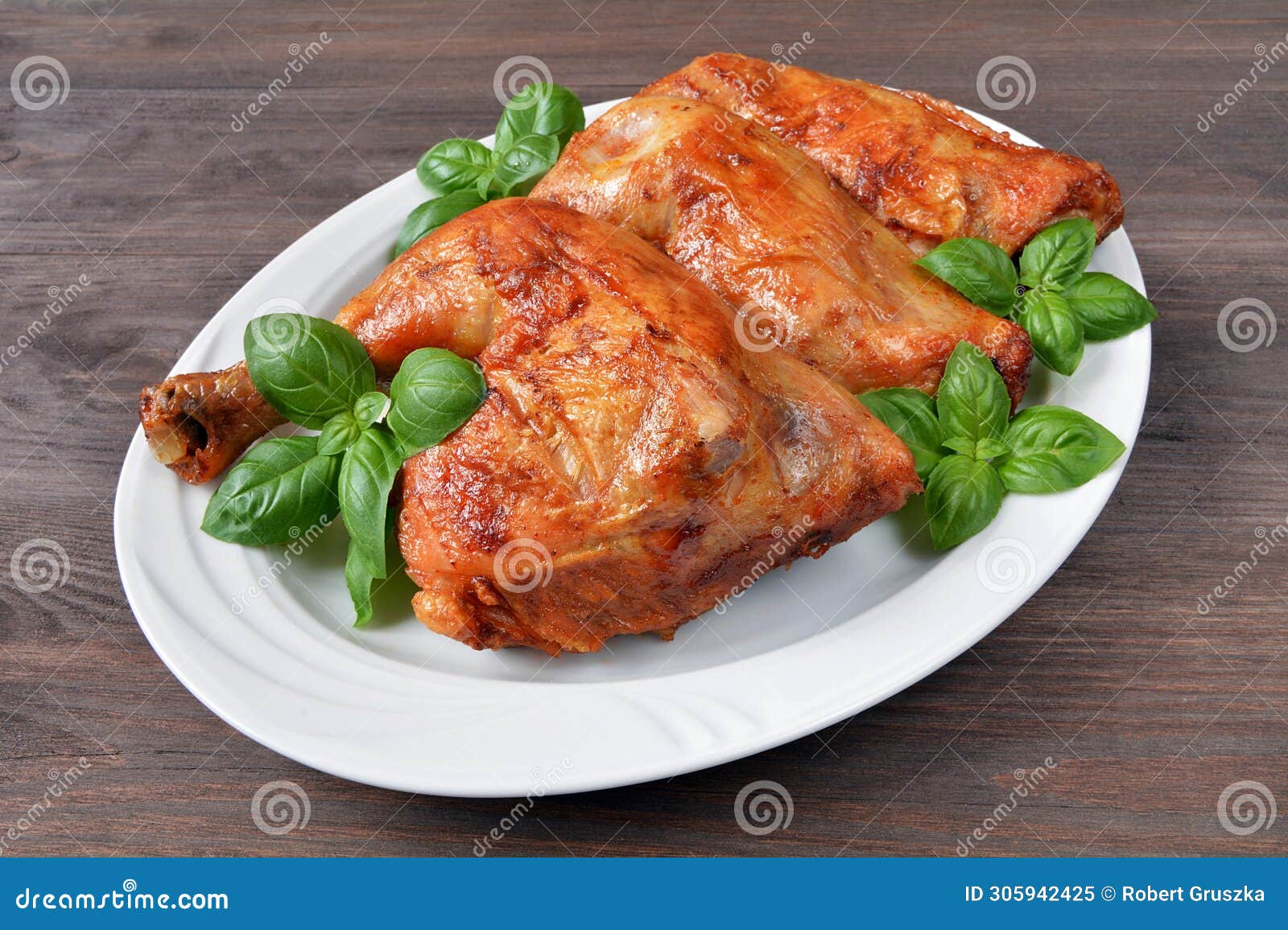Baked chicken leg stock image. Image of leaf, meal, grill - 305942425