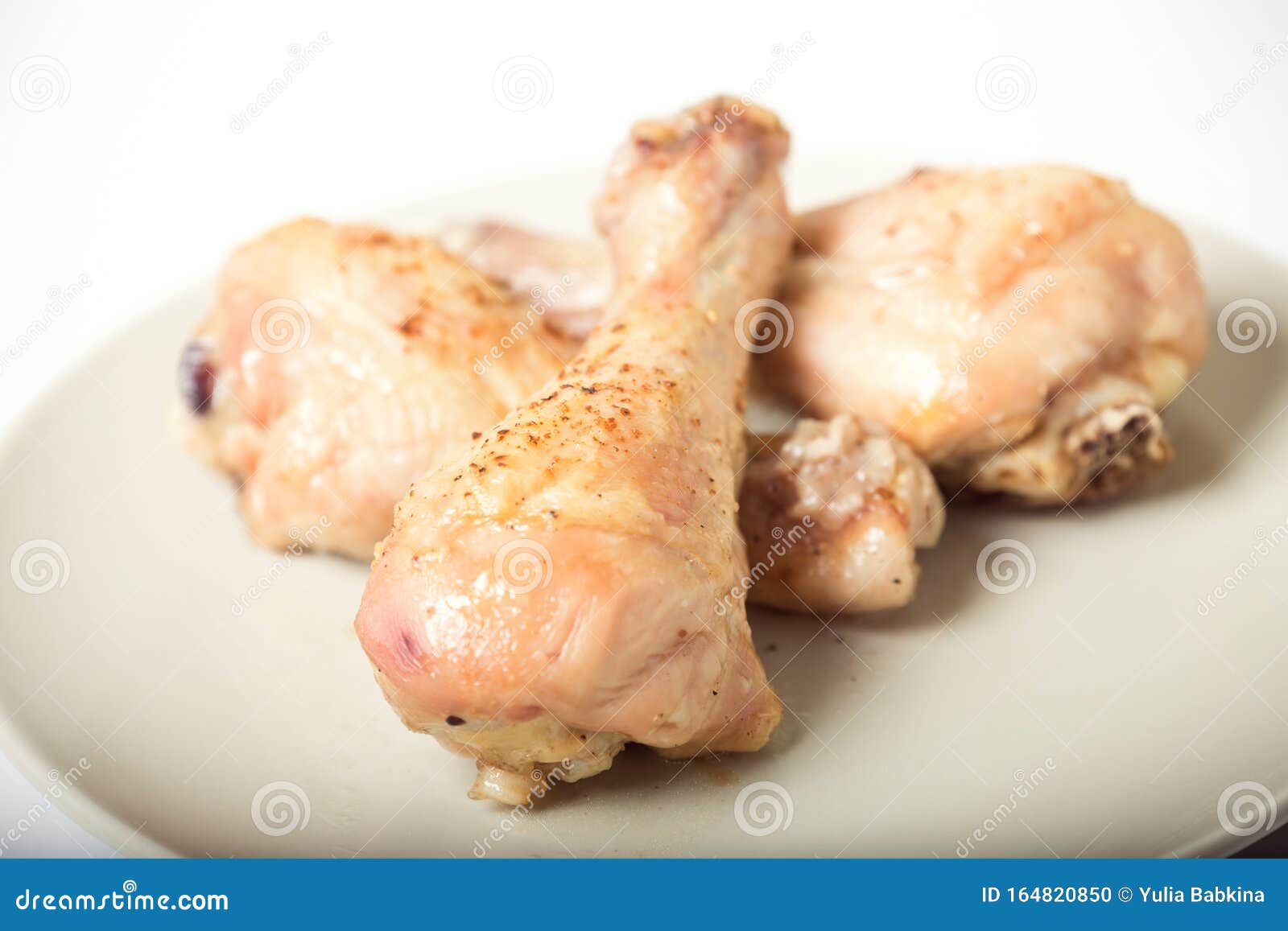 Baked Chicken Legs on Plate Stock Photo - Image of edible, cooking ...