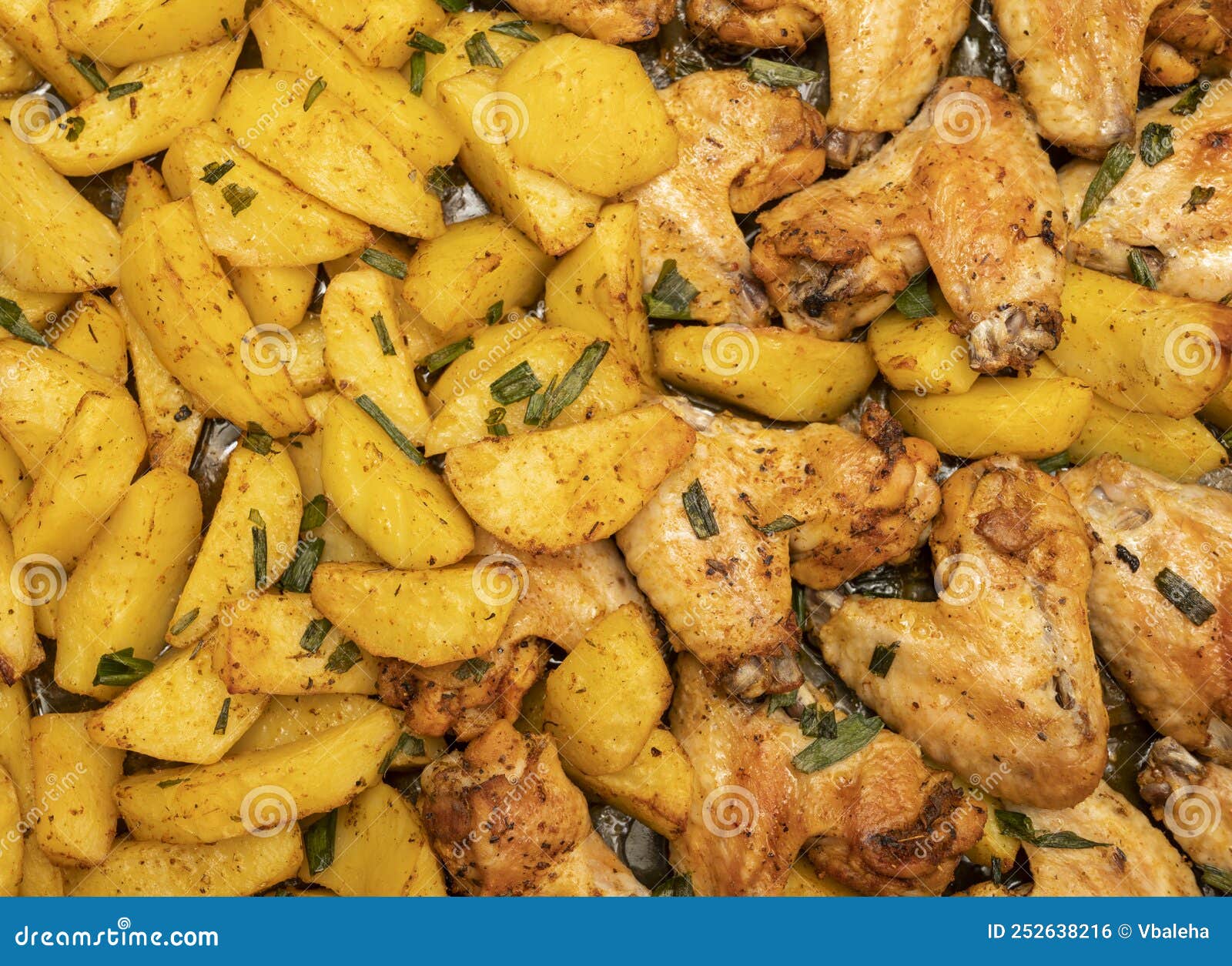 Baked Chicken Wings with Potatoes Stock Photo - Image of marinated ...