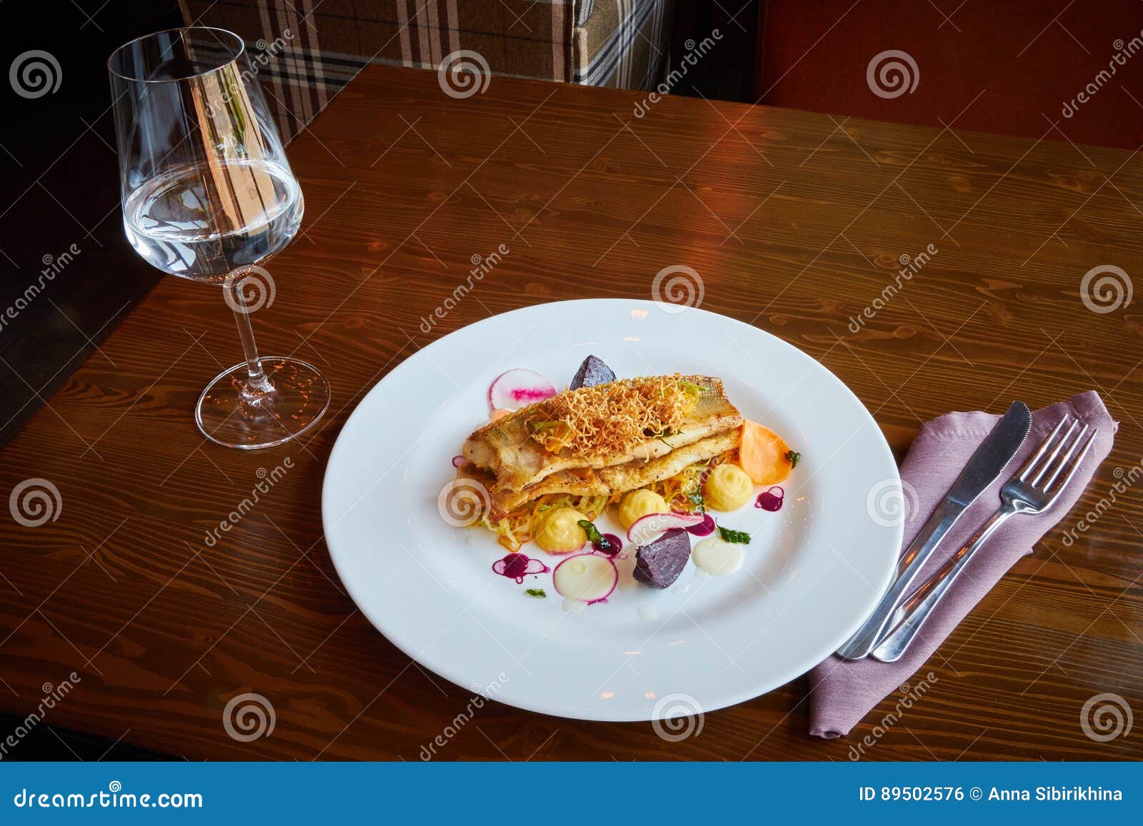 Baked Cod Fillet with Vegetables in Restaurant Interior Stock Photo ...