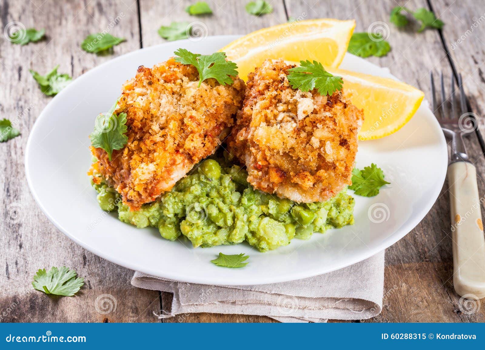 Baked Cod Fish in Breadcrumbs with Mashed Green Peas and Broccoli Stock ...