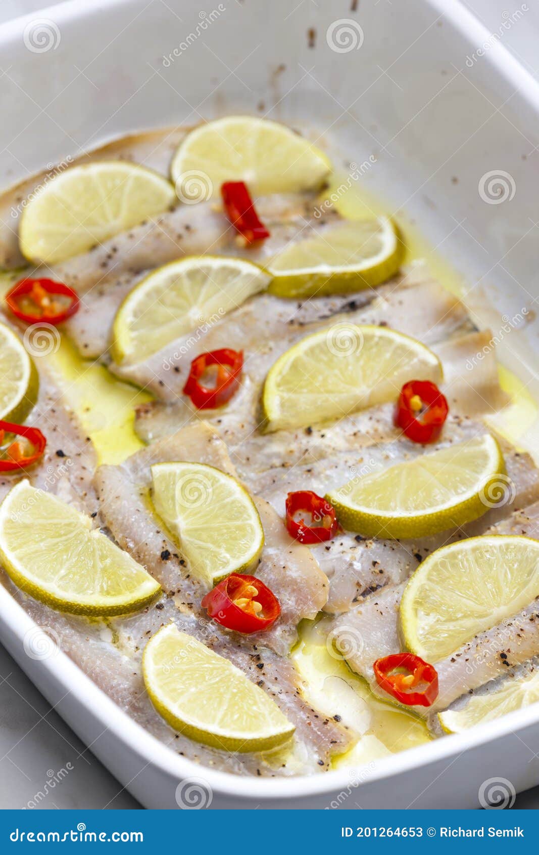 Baked Cod Fish with Lemon and Chilli Stock Image - Image of pepper ...