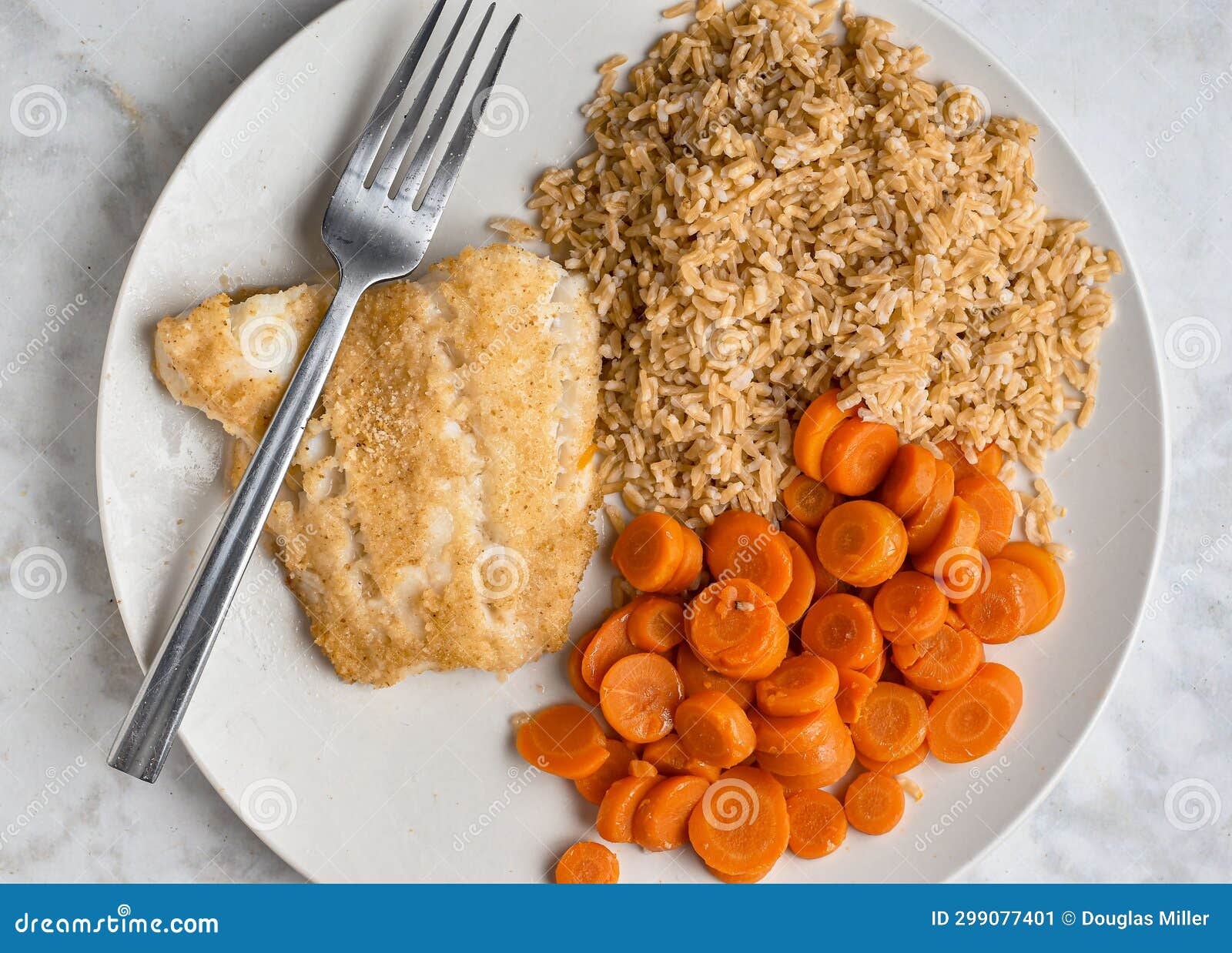 Baked Cod with a Side of Carrots and Brown Rice Stock Image - Image of ...