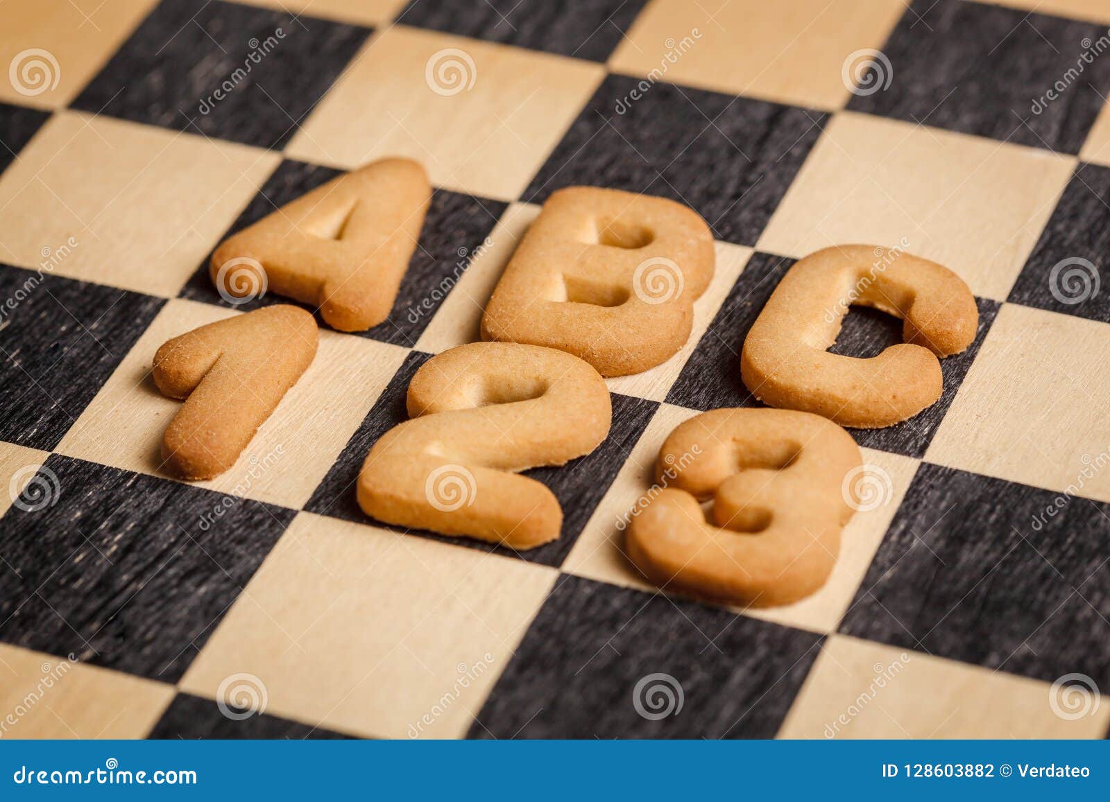 Cookie Letters and Numbers on an Old Checkboard Stock Photo - Image of ...