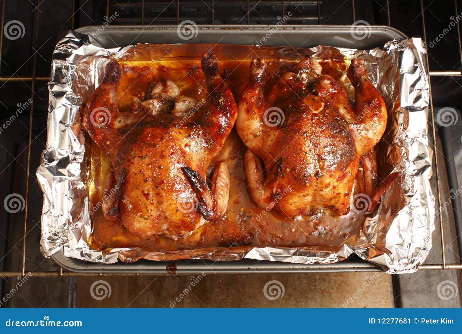 Baked Cornish game hens stock image. Image of foil, indoor - 12277681