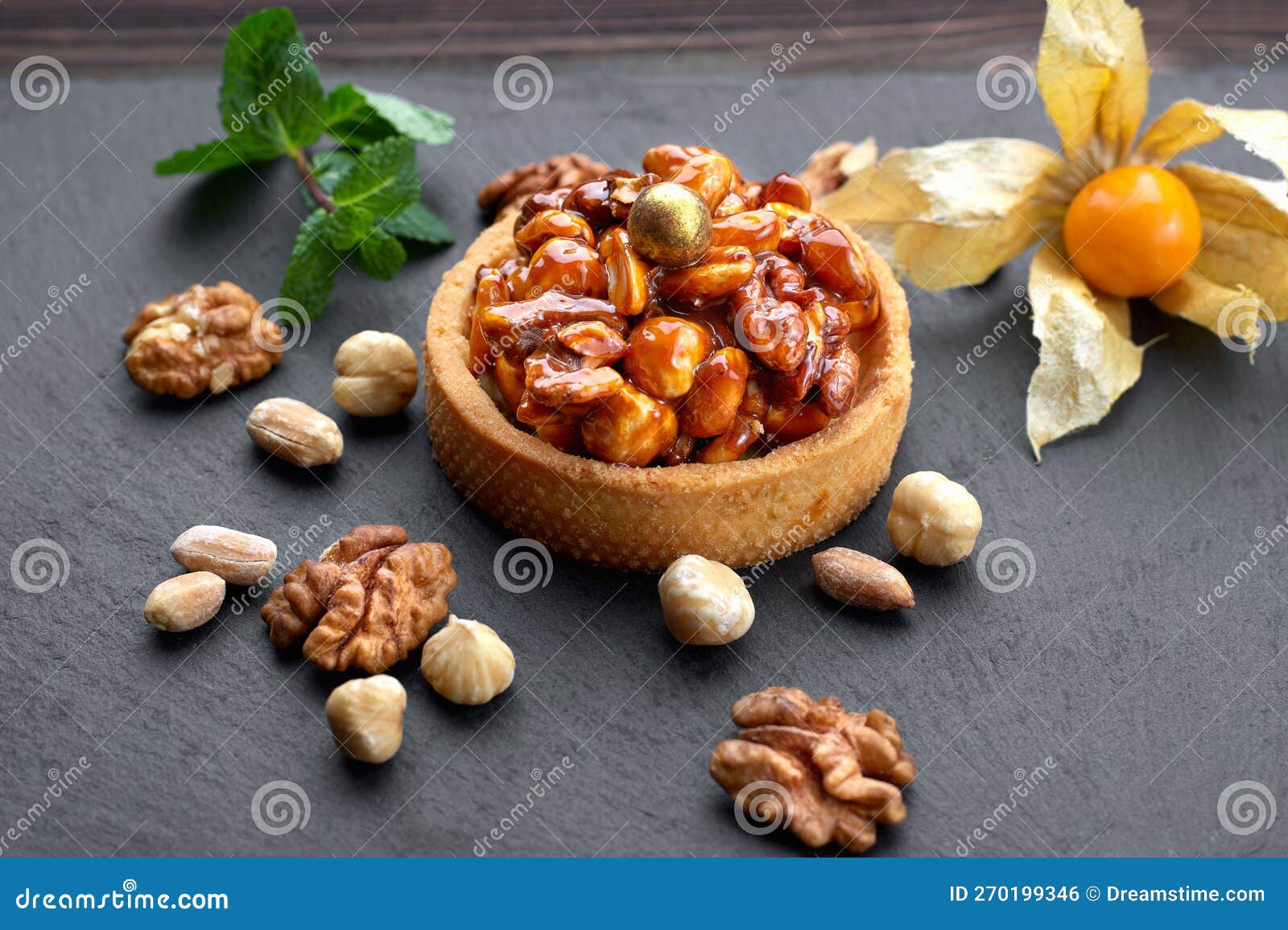 Baked Dessert with Caramelized Nuts, on a Black Background Stock Photo ...
