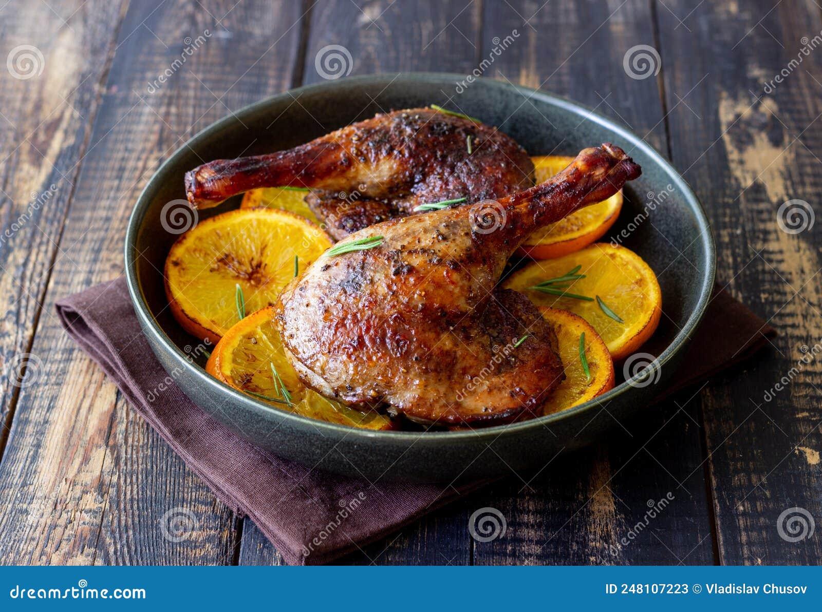 Baked Duck Legs with Oranges and Rosemary. Rustic Style Stock Image ...