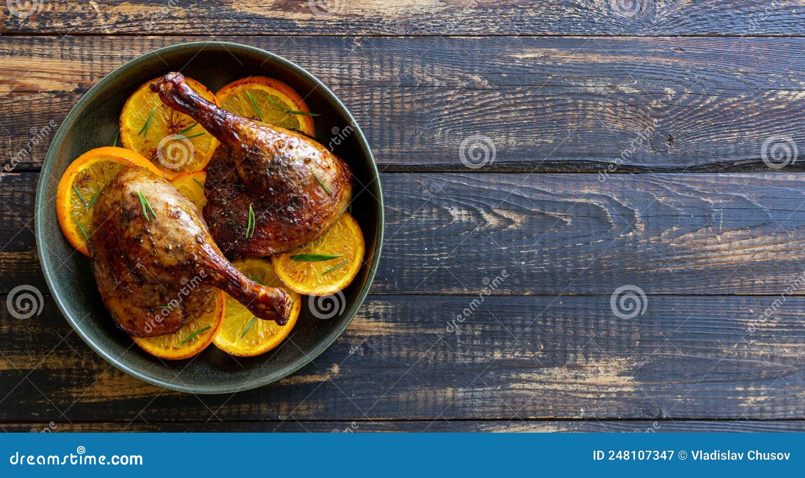 Baked Duck Legs with Oranges and Rosemary. Rustic Style Stock Image ...
