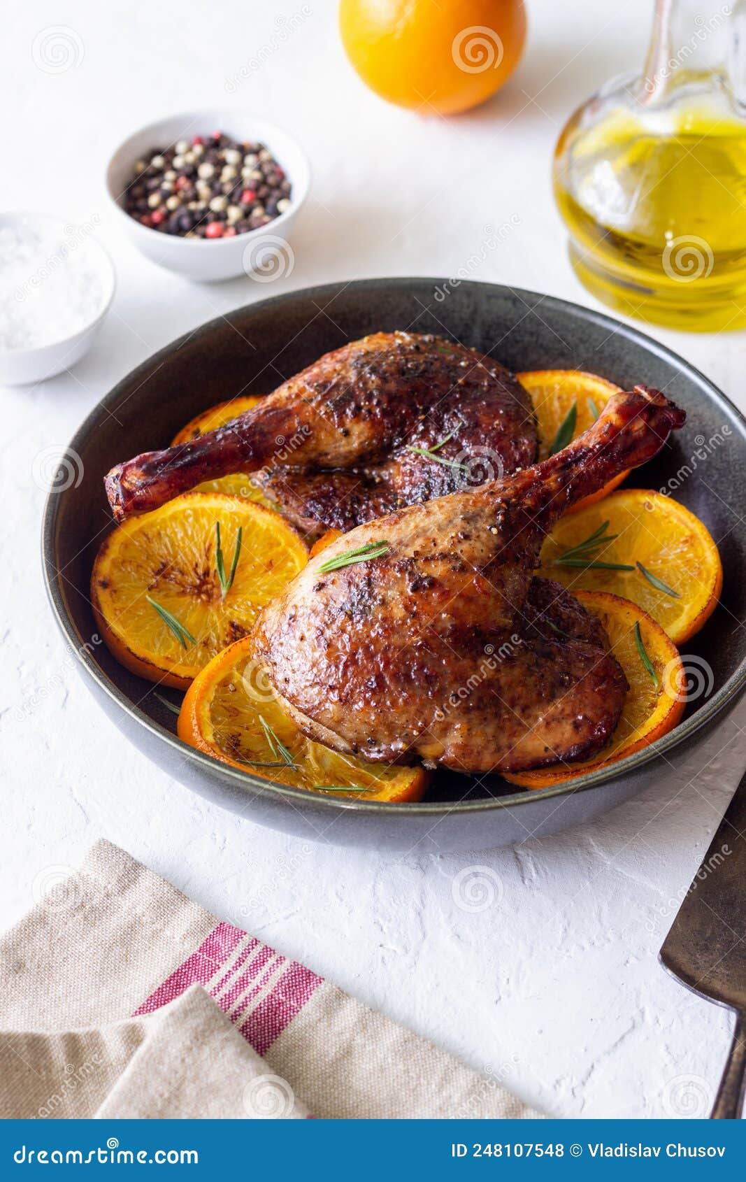 Baked Duck Legs with Oranges and Rosemary. Rustic Style Stock Photo ...