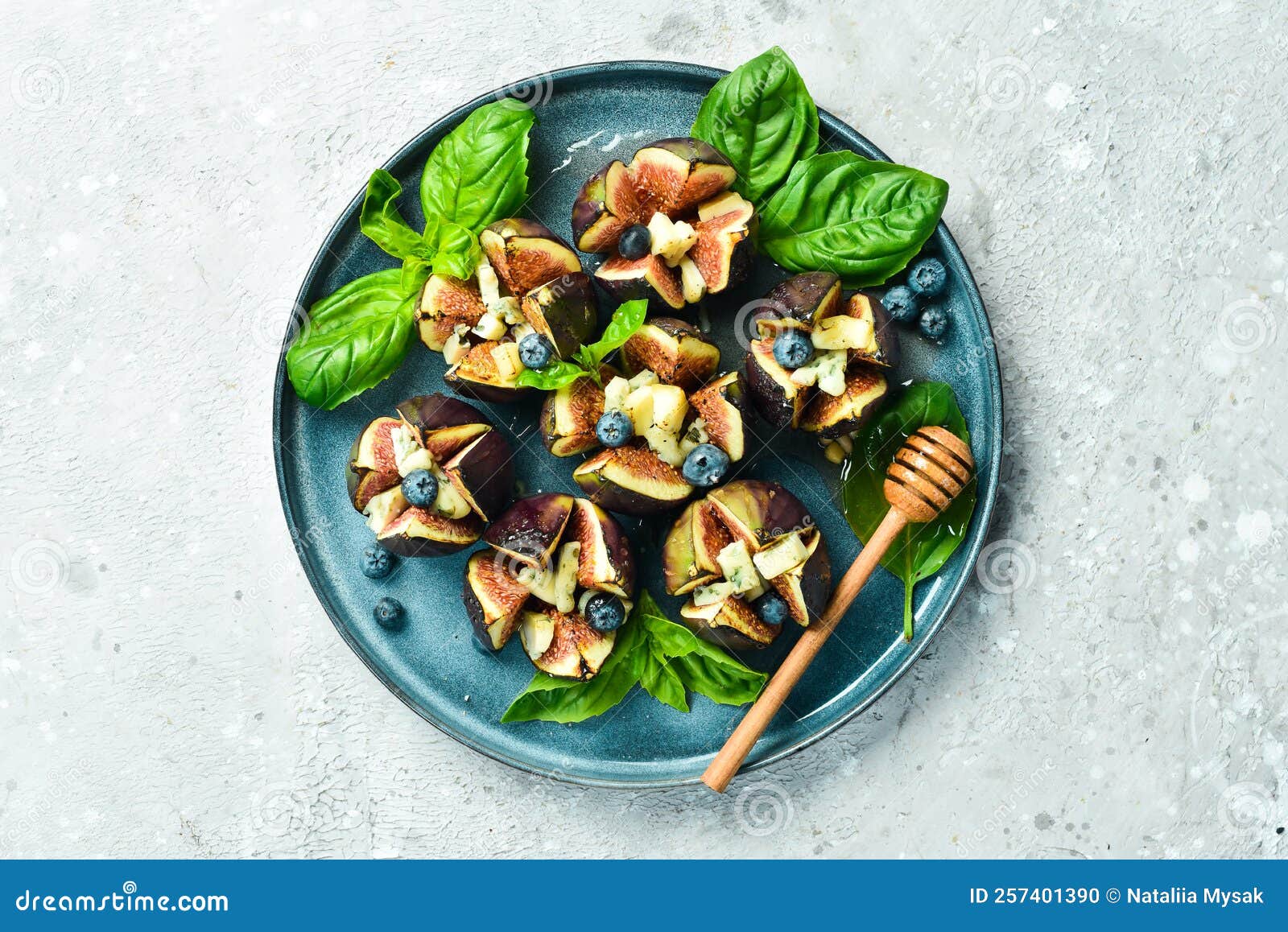 Baked Figs with Cheese, Honey and Nuts. in a Plate Stock Photo - Image ...