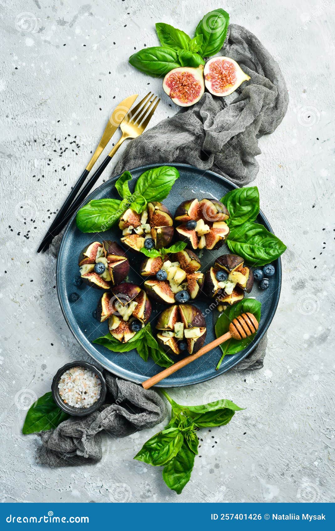 Baked Figs with Cheese, Honey and Nuts. in a Plate Stock Photo - Image ...