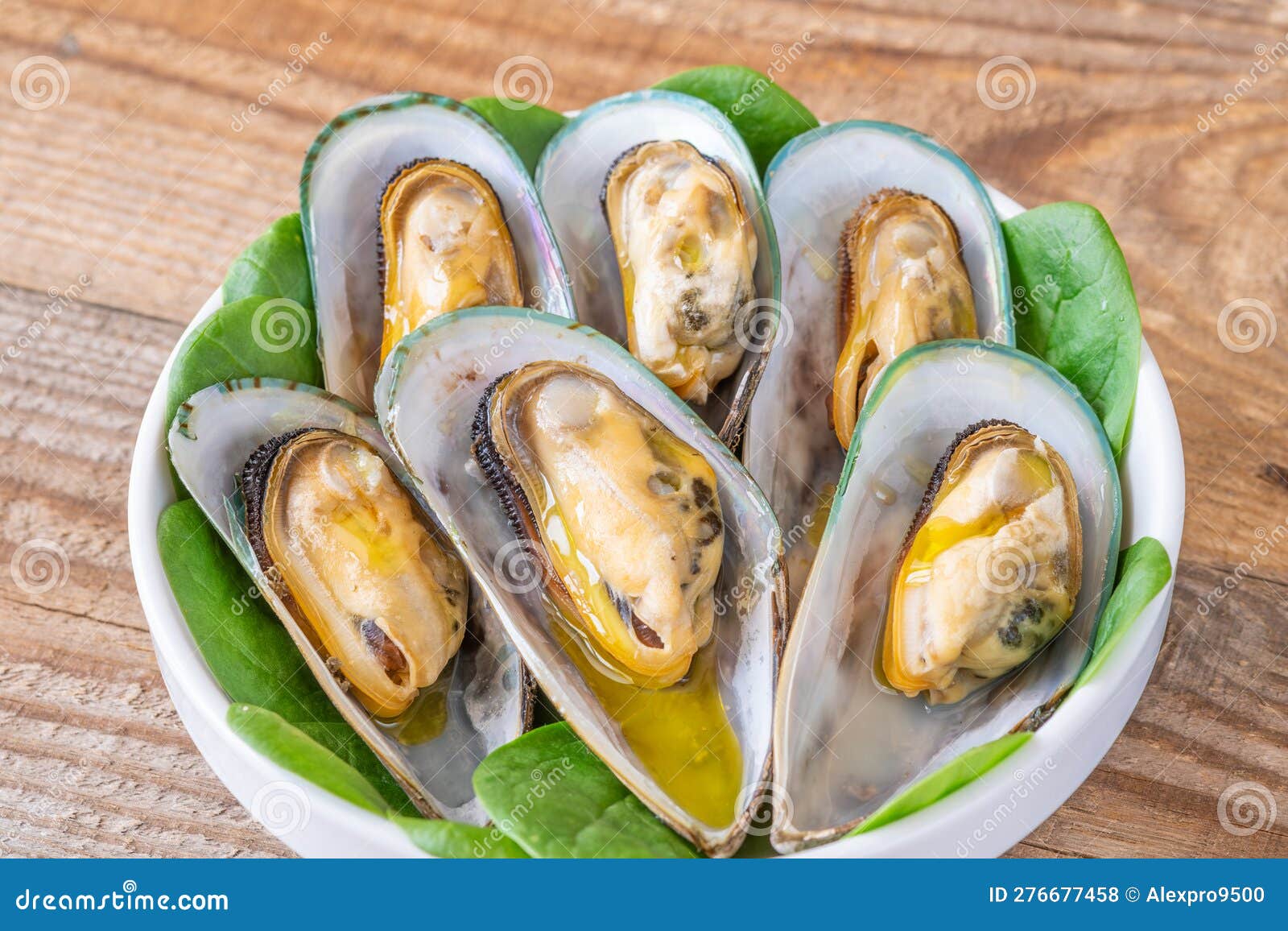 Baked half shell mussels stock photo. Image of cuisine - 276677458