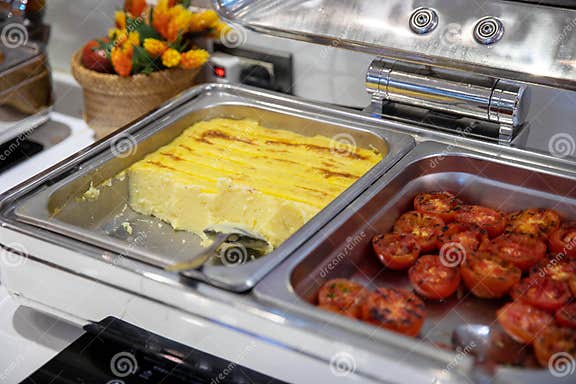 Baked Mashed Potatoes in a Tray and Served with Baked Tomato Stock ...