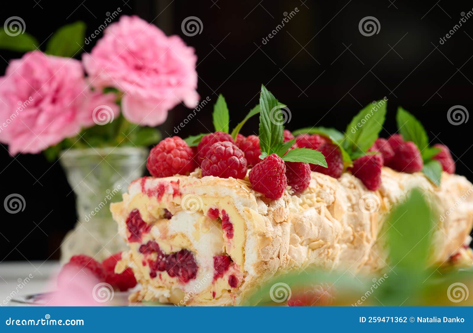 Baked Meringue Roll with Cream and Fresh Red Raspberry Stock Photo ...