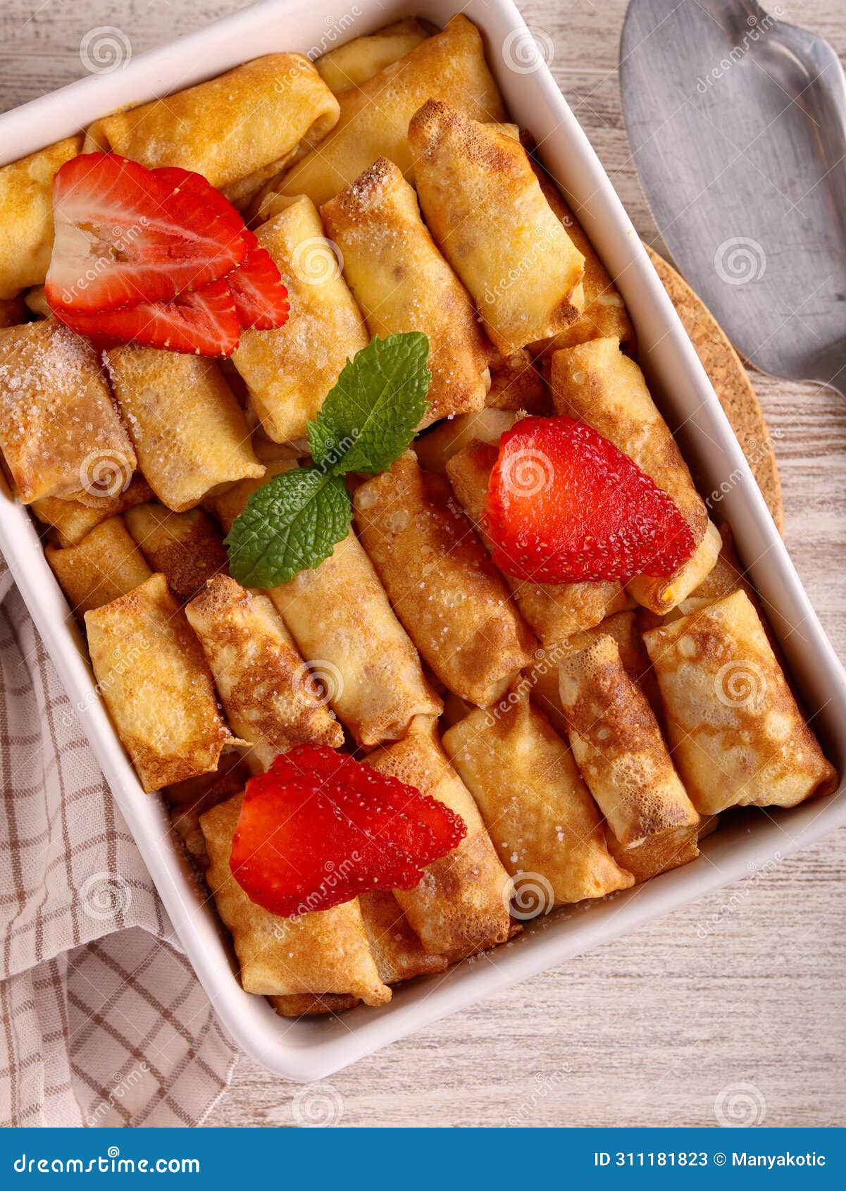 Baked Mini Crepes Rolls Filled with Cheese Stock Image - Image of rolls ...