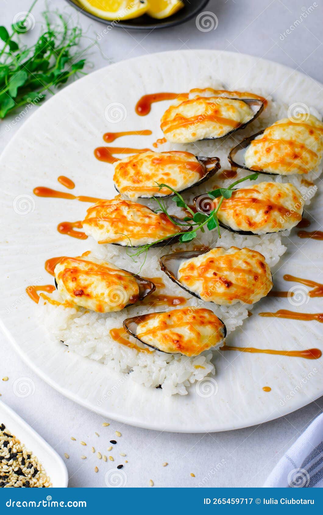 Baked Mussels with Cheese in Shells on Rice in a Plate Stock Image ...