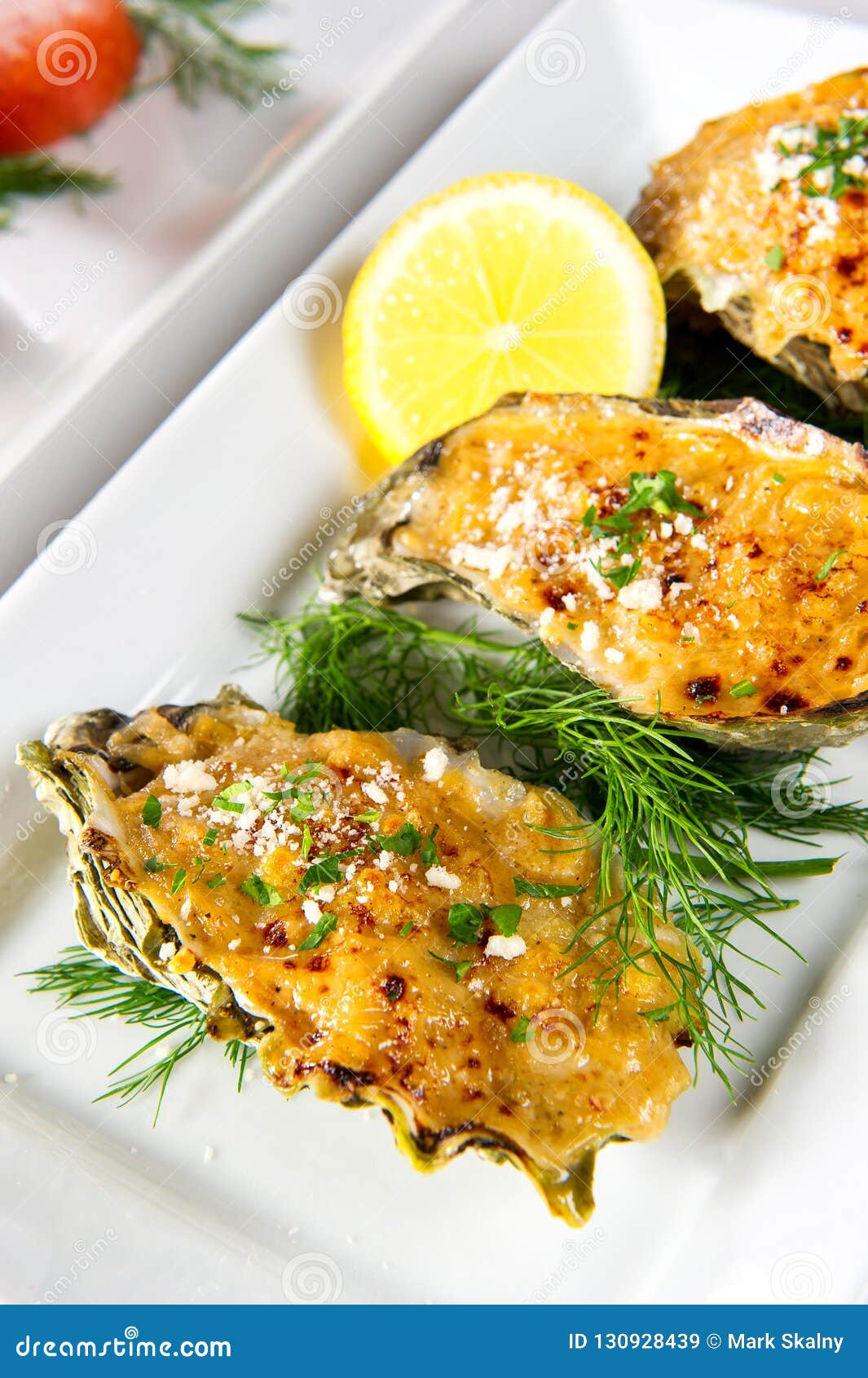 Baked Oysters stock image. Image of cuisine, lemon, herbs - 130928439