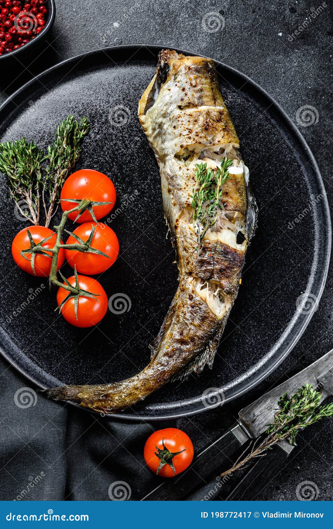 Baked Pollock Cooked in a Savory Marinade. Black Background Stock Image ...