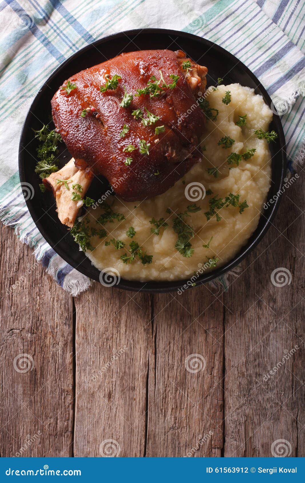 Baked Pork Knuckle and Mashed Potatoes Closeup. Vertical Top Vie Stock ...