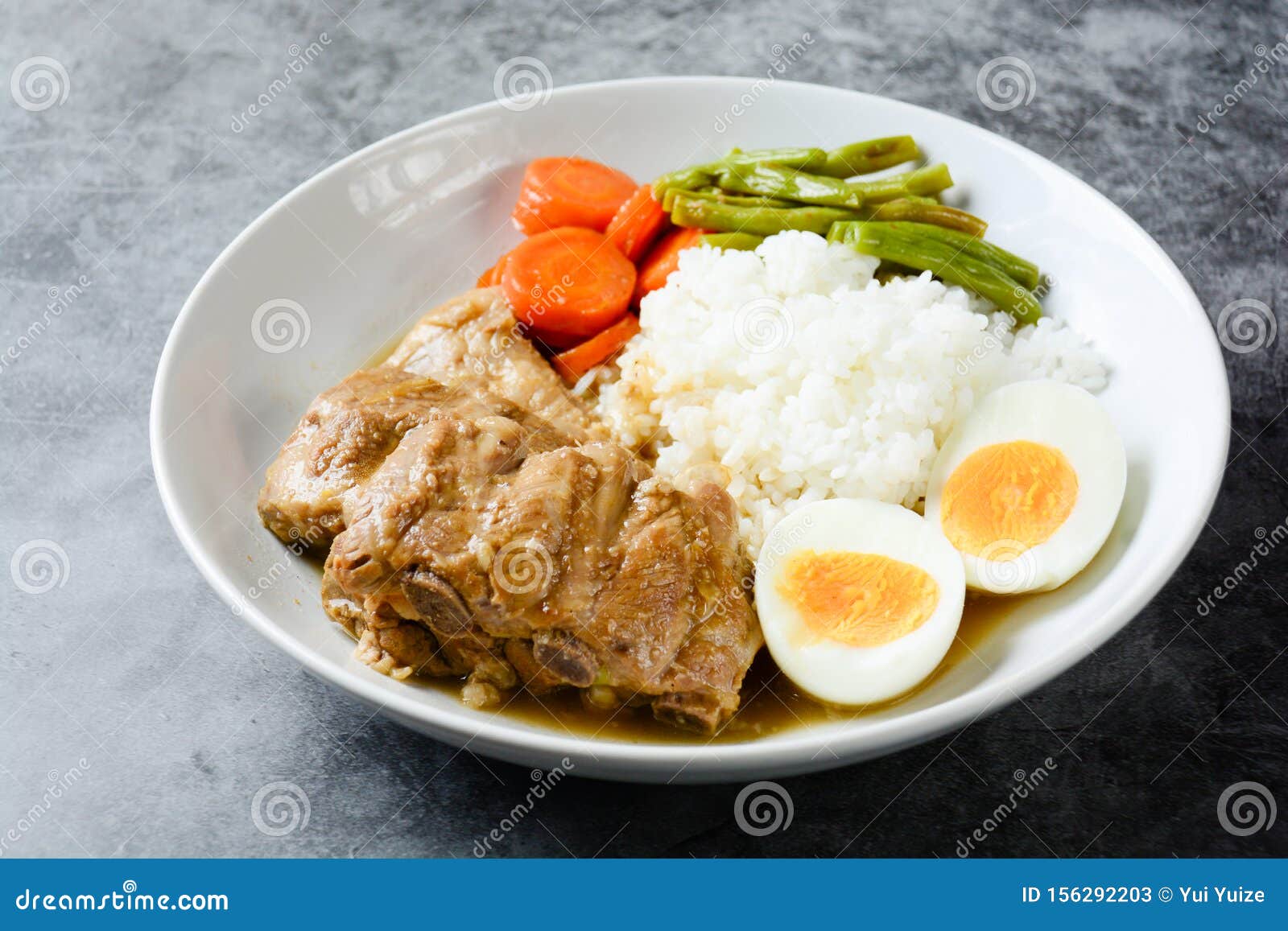 Baked pork ribs with rice stock image. Image of barbecue - 156292203
