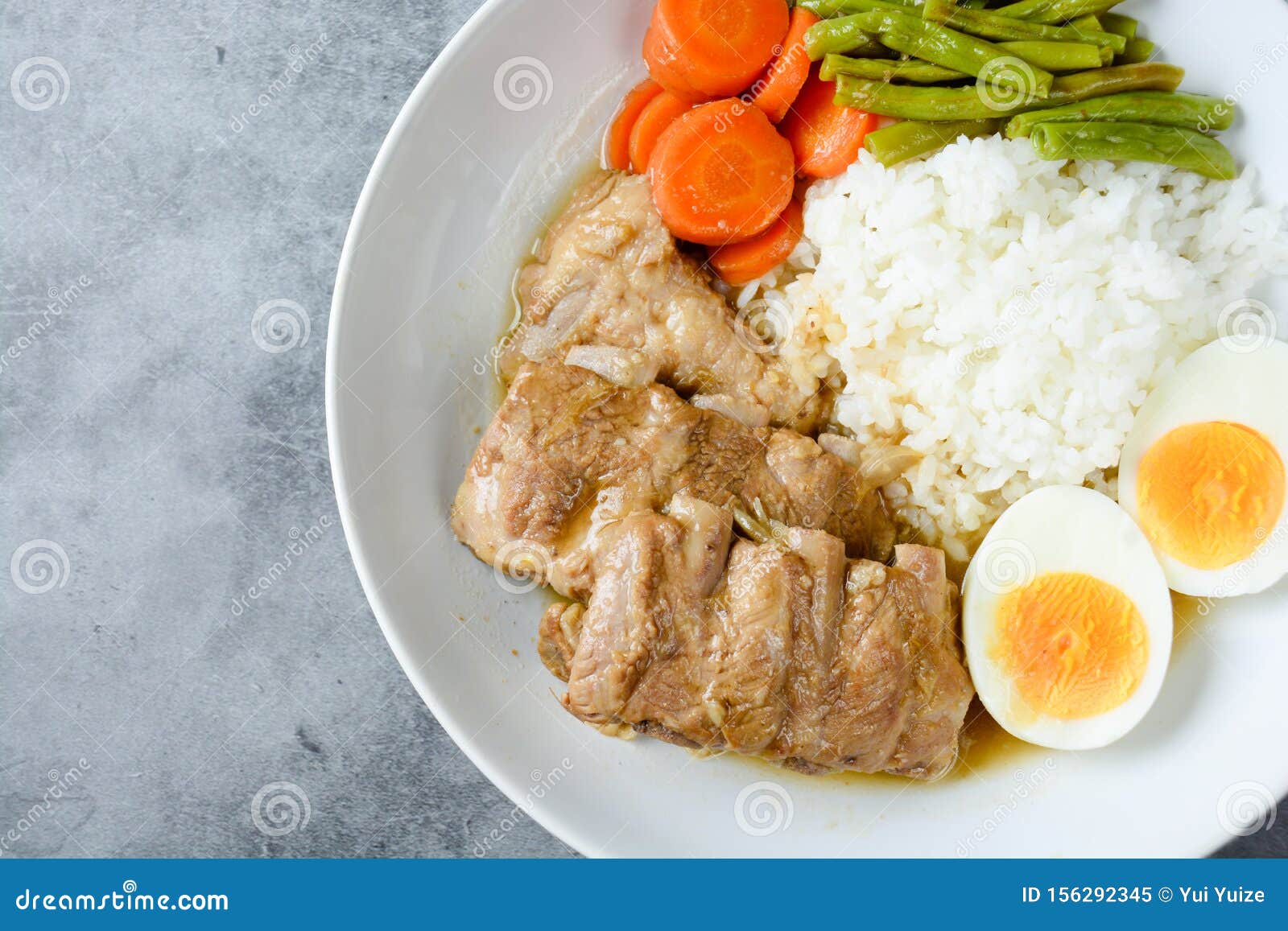 Baked pork ribs with rice stock image. Image of cooked - 156292345
