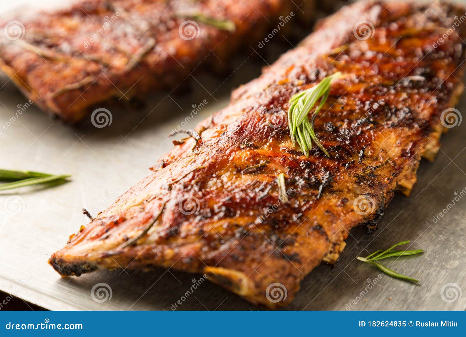 Baked pork ribs with sauce stock image. Image of juice - 182624835
