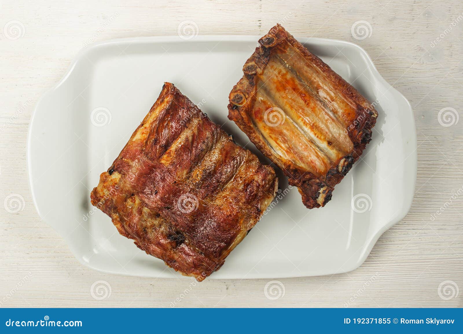 Baked Pork Ribs on a White Plate, Top View Stock Image - Image of ...