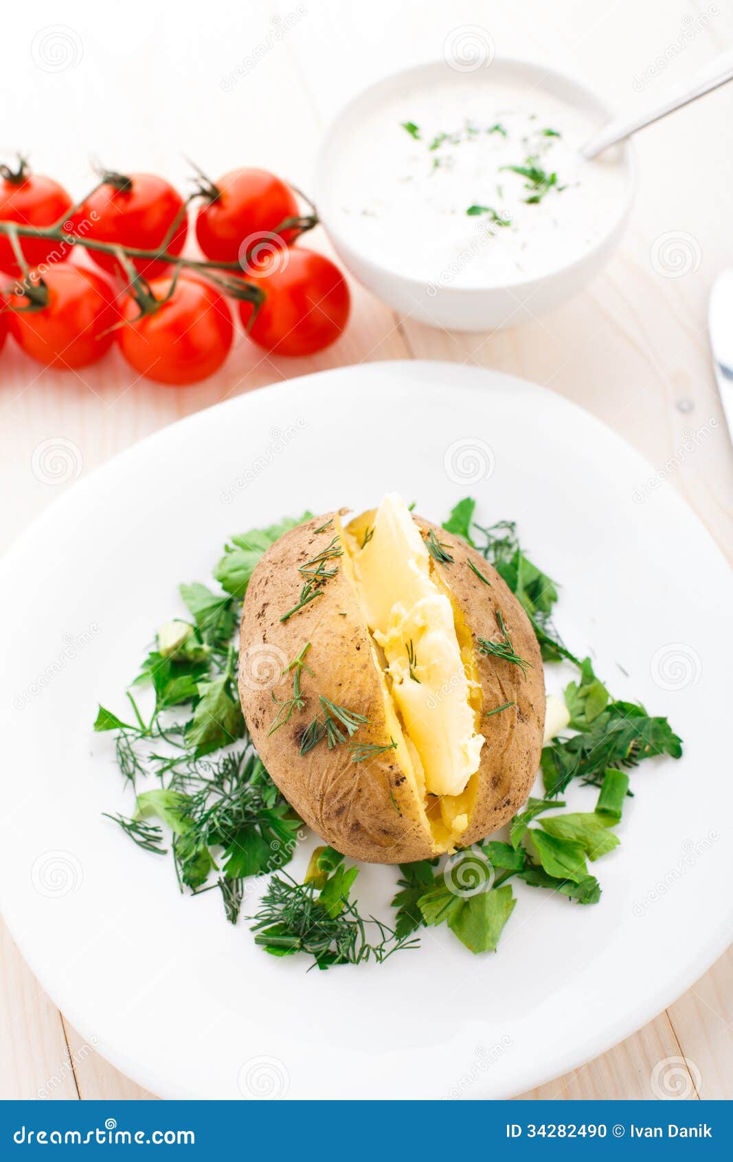 Baked potato with butter stock photo. Image of green - 34282490