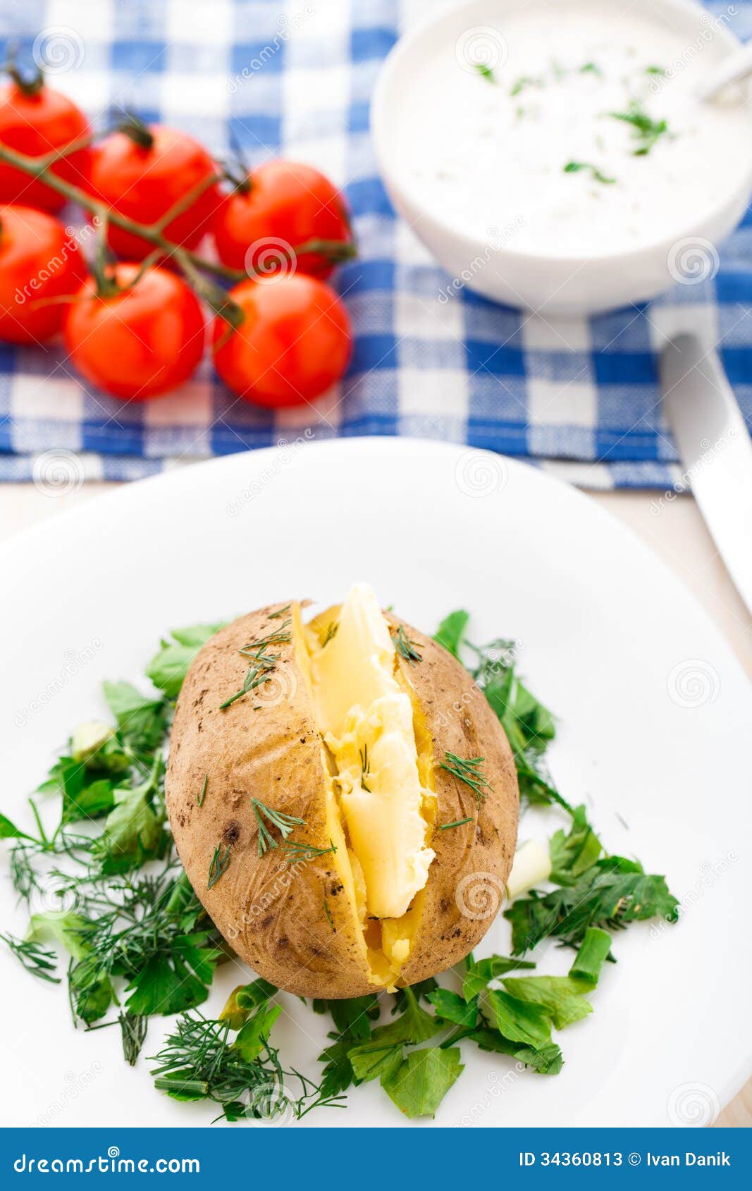 Baked potato with butter stock image. Image of green - 34360813
